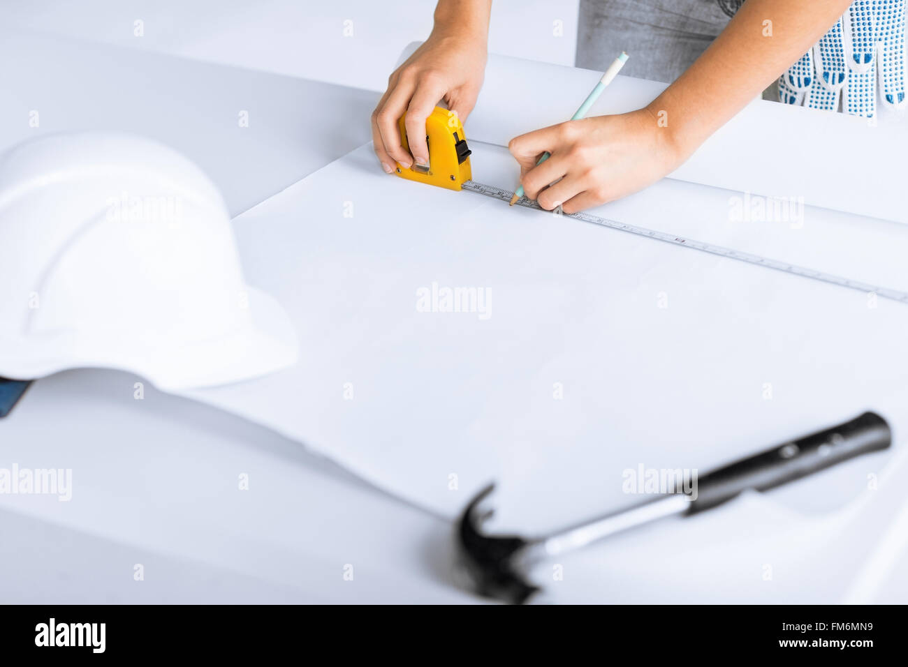architect drawing on blueprint Stock Photo - Alamy