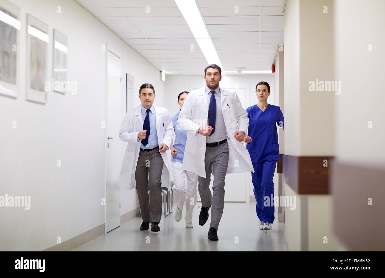 group of medics walking along hospital Stock Photo - Alamy