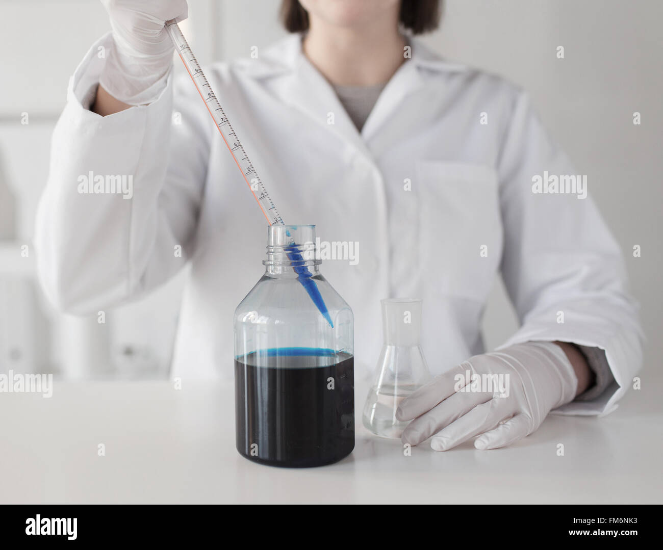 close up of scientist making test in lab Stock Photo - Alamy