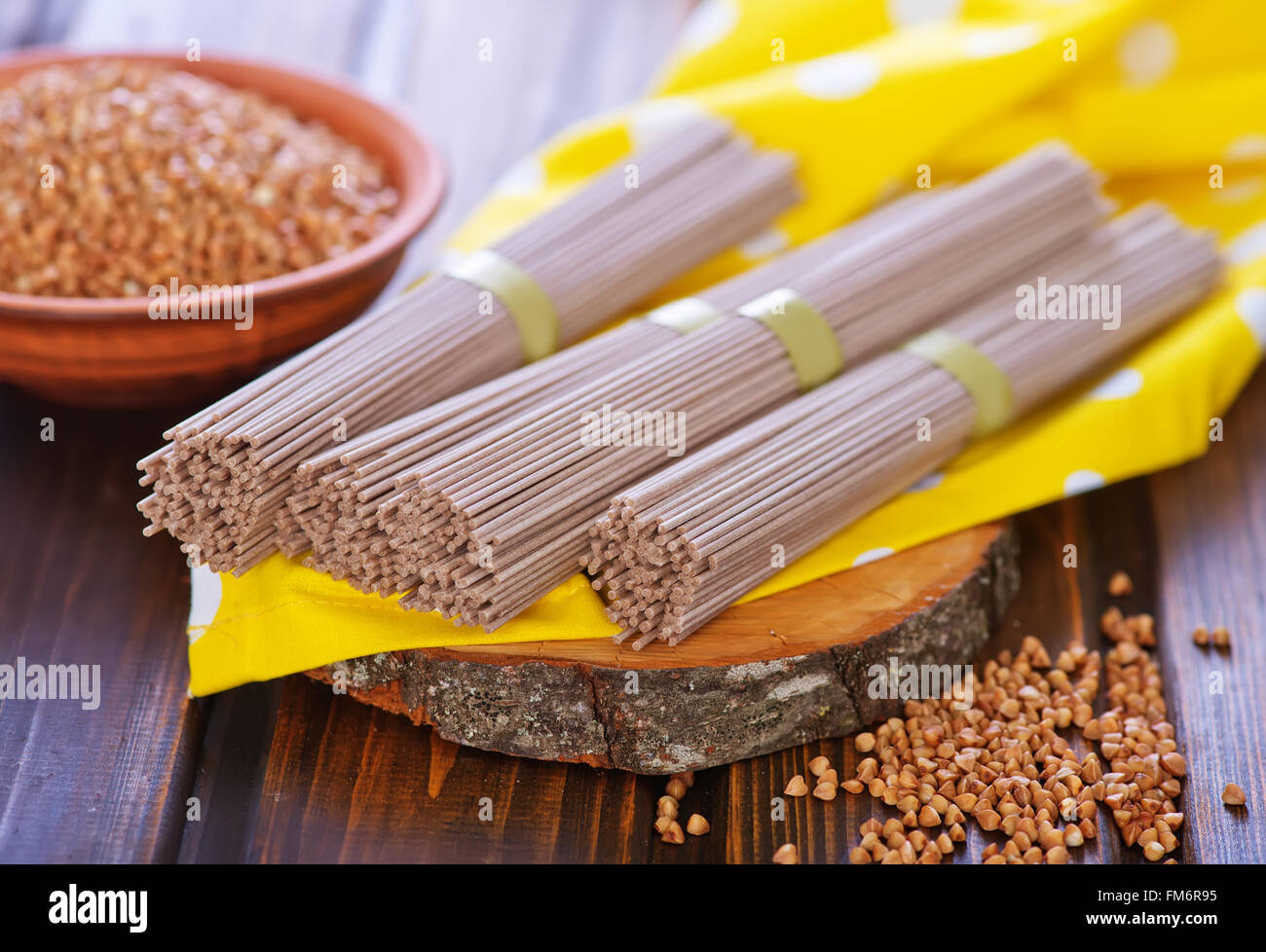 raw soba noodles on the wooden table Stock Photo - Alamy