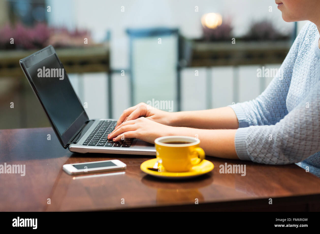 Woman networking on cellphone typing hi-res stock photography and ...