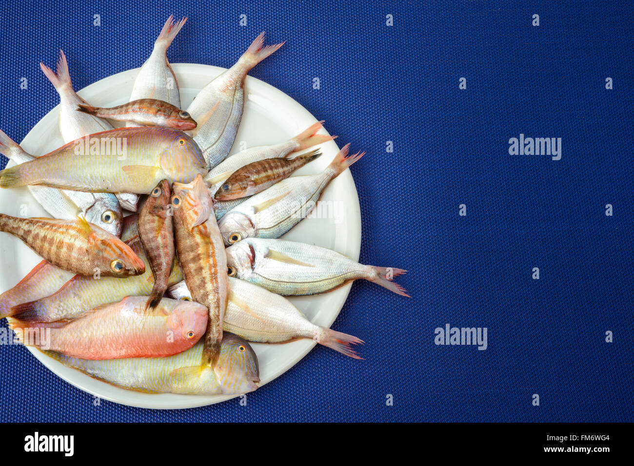 recently caught fish ready to be cooked Stock Photo - Alamy