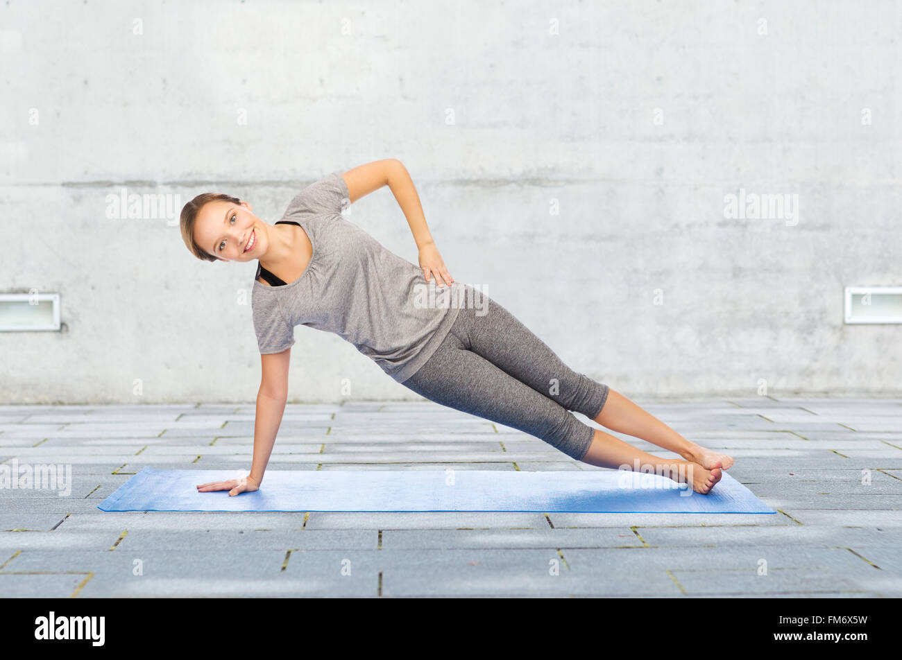 Side plank pose hi-res stock photography and images - Alamy