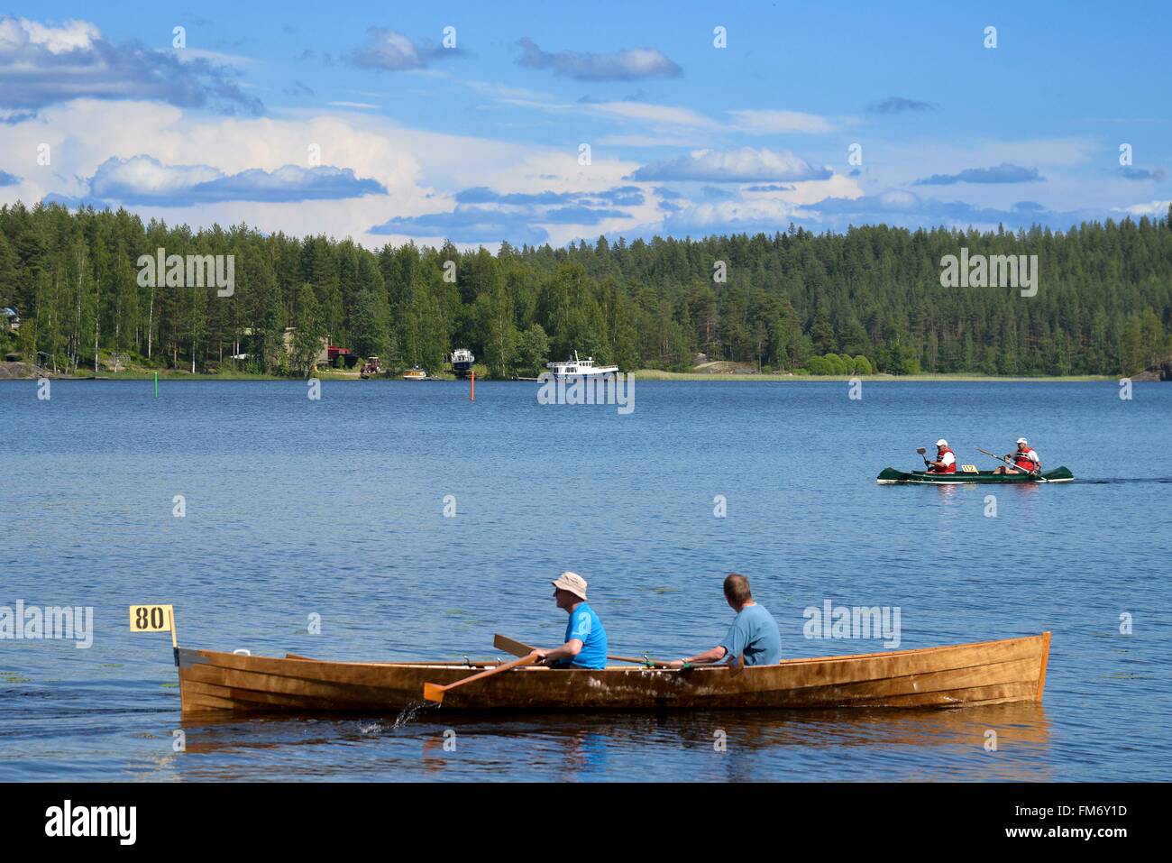 Finland, province of oriental Finland, Sulkava, wooden canoes on a lake ...