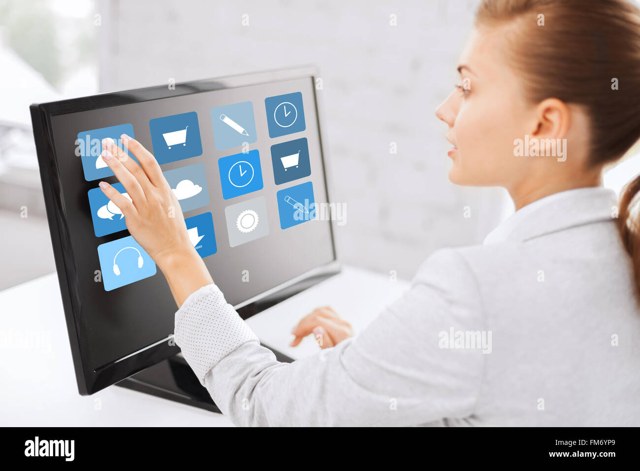 businesswoman with computer touchscreen in office Stock Photo - Alamy