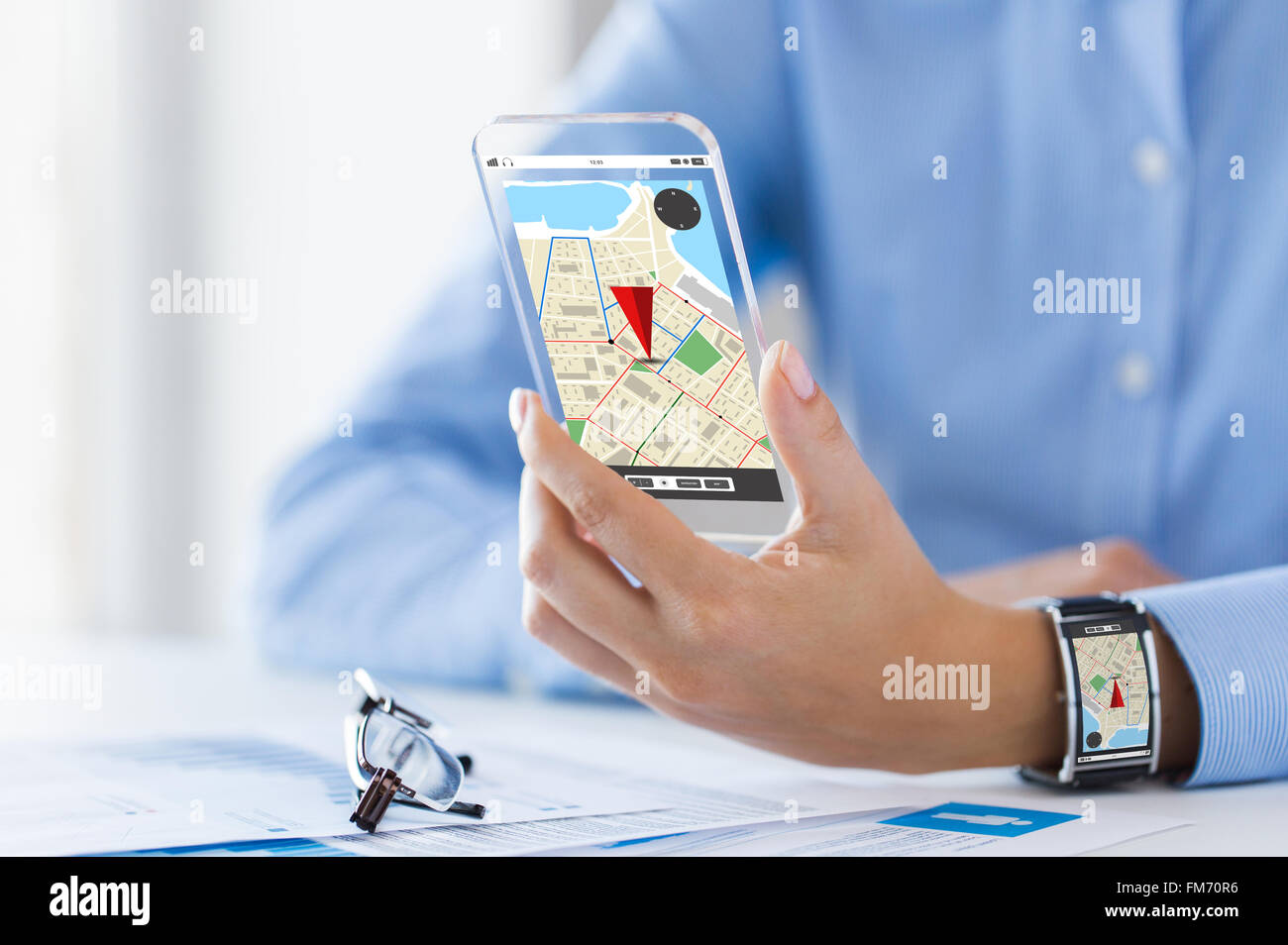 hand with navigator map on smart phone and watch Stock Photo - Alamy