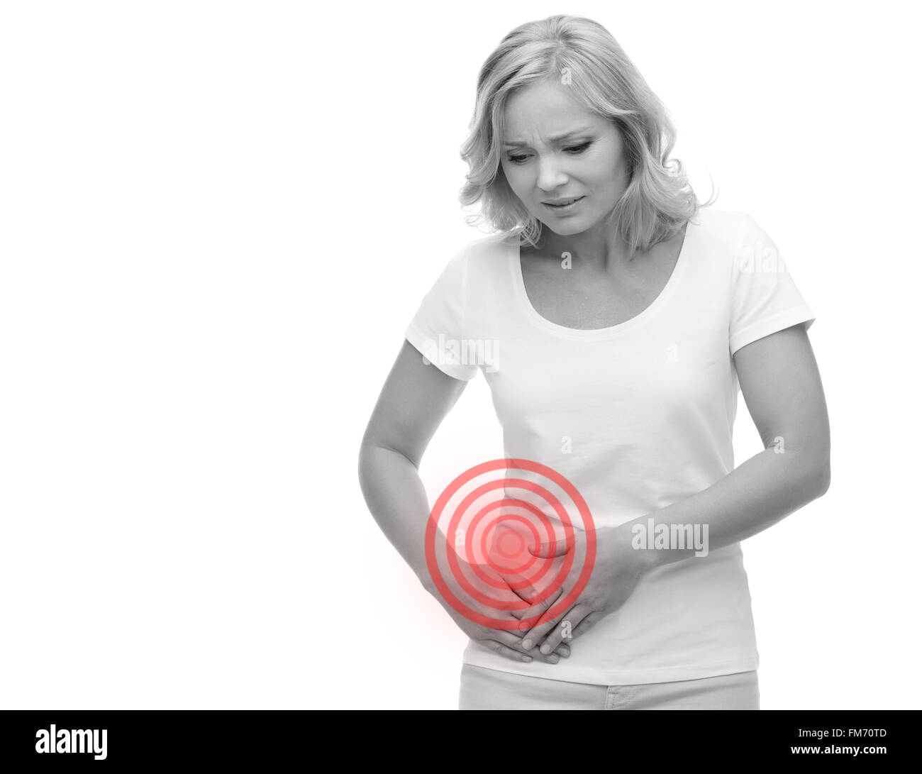 unhappy woman suffering from stomach ache Stock Photo - Alamy
