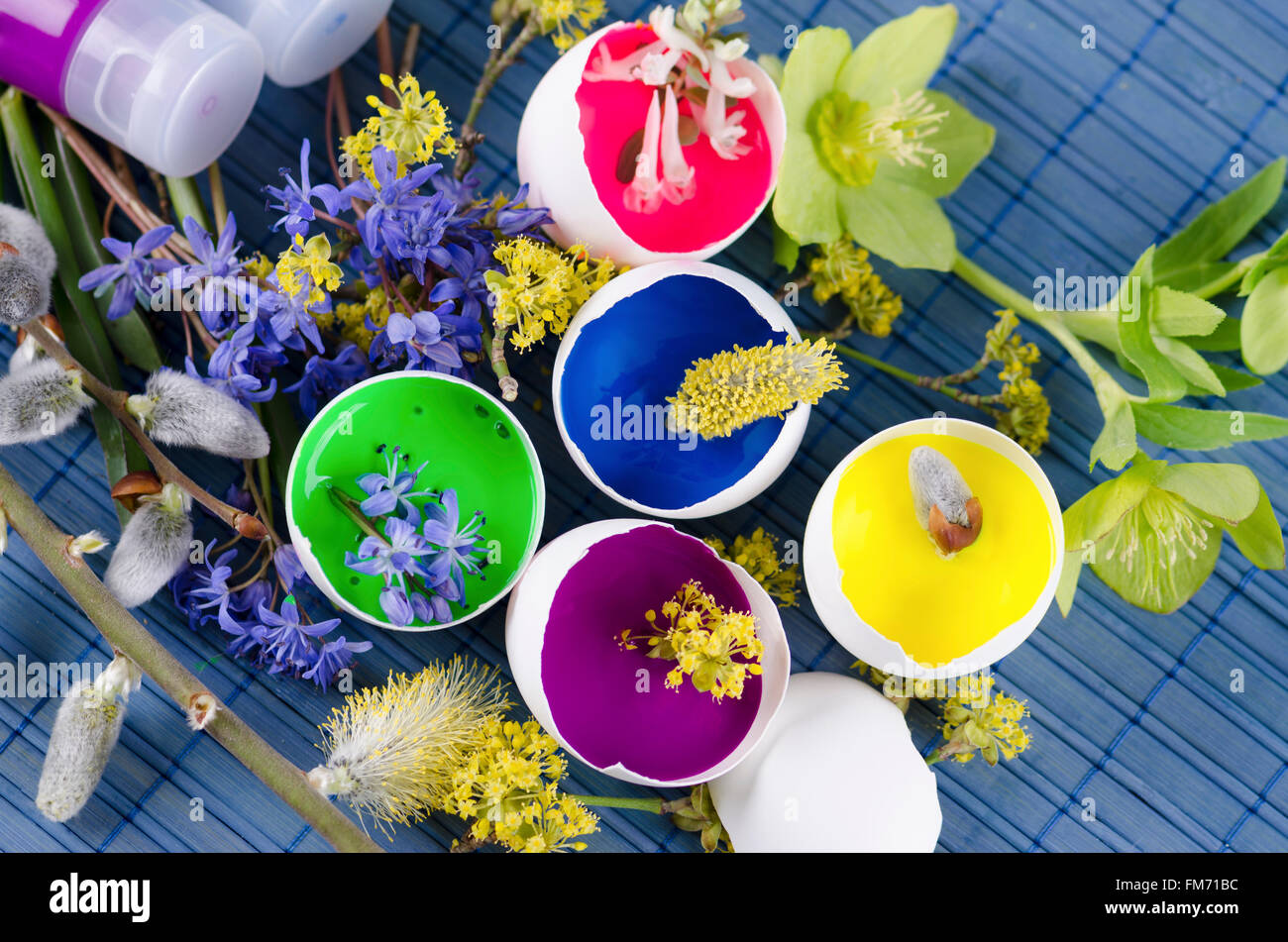 Beautiful Easter decoration with egg shells with paints and spring ...
