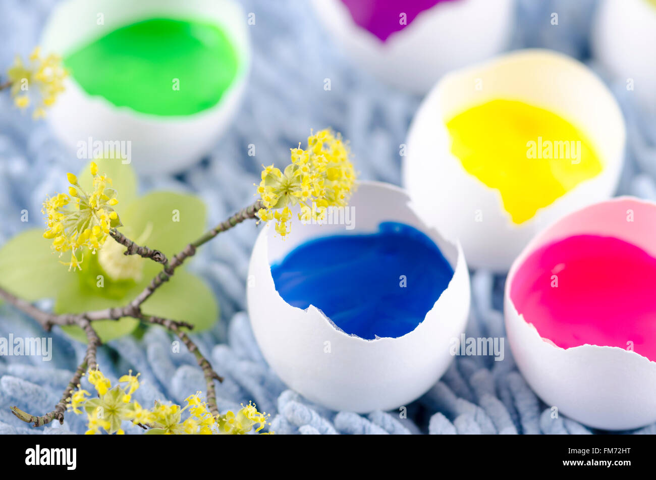Happy colorful Easter shells filled with tempera paint and spring ...