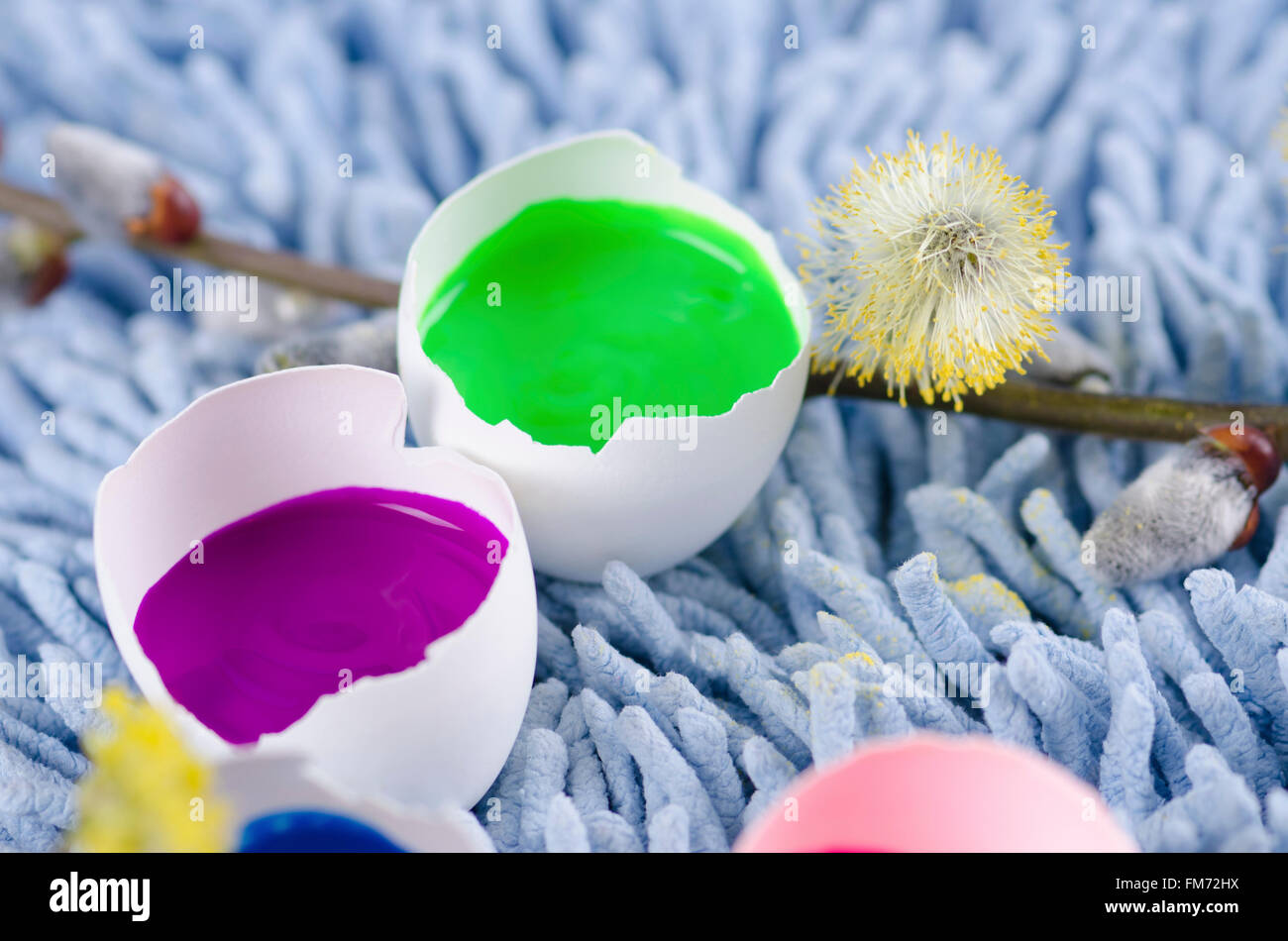 Happy Easter decoration with colorful egg shells filled with tempera ...