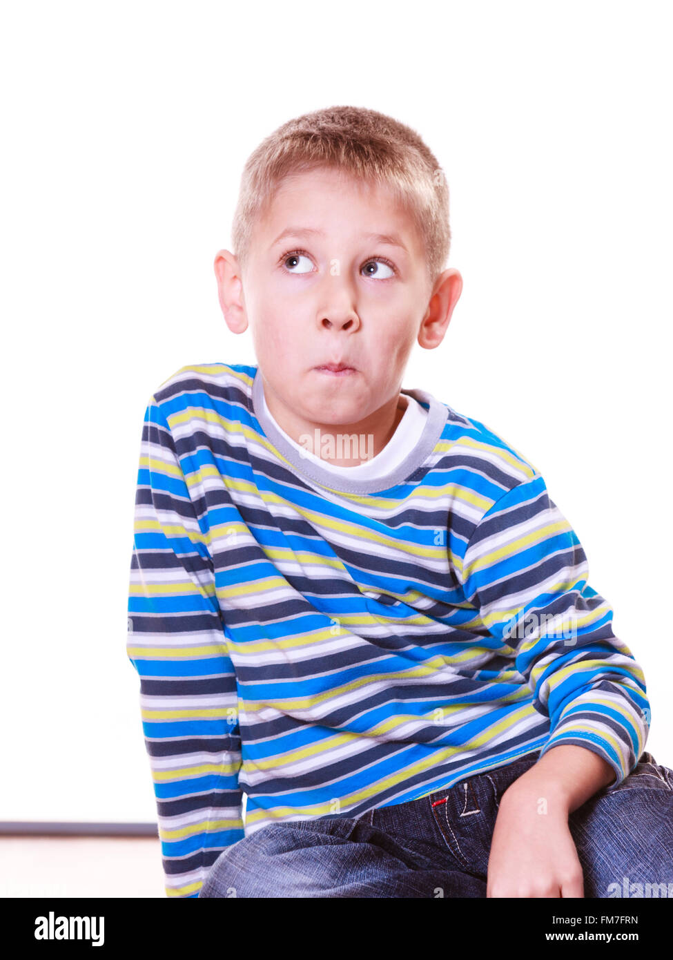 Free time, fun and expression. Little boy play indoors make silly ...