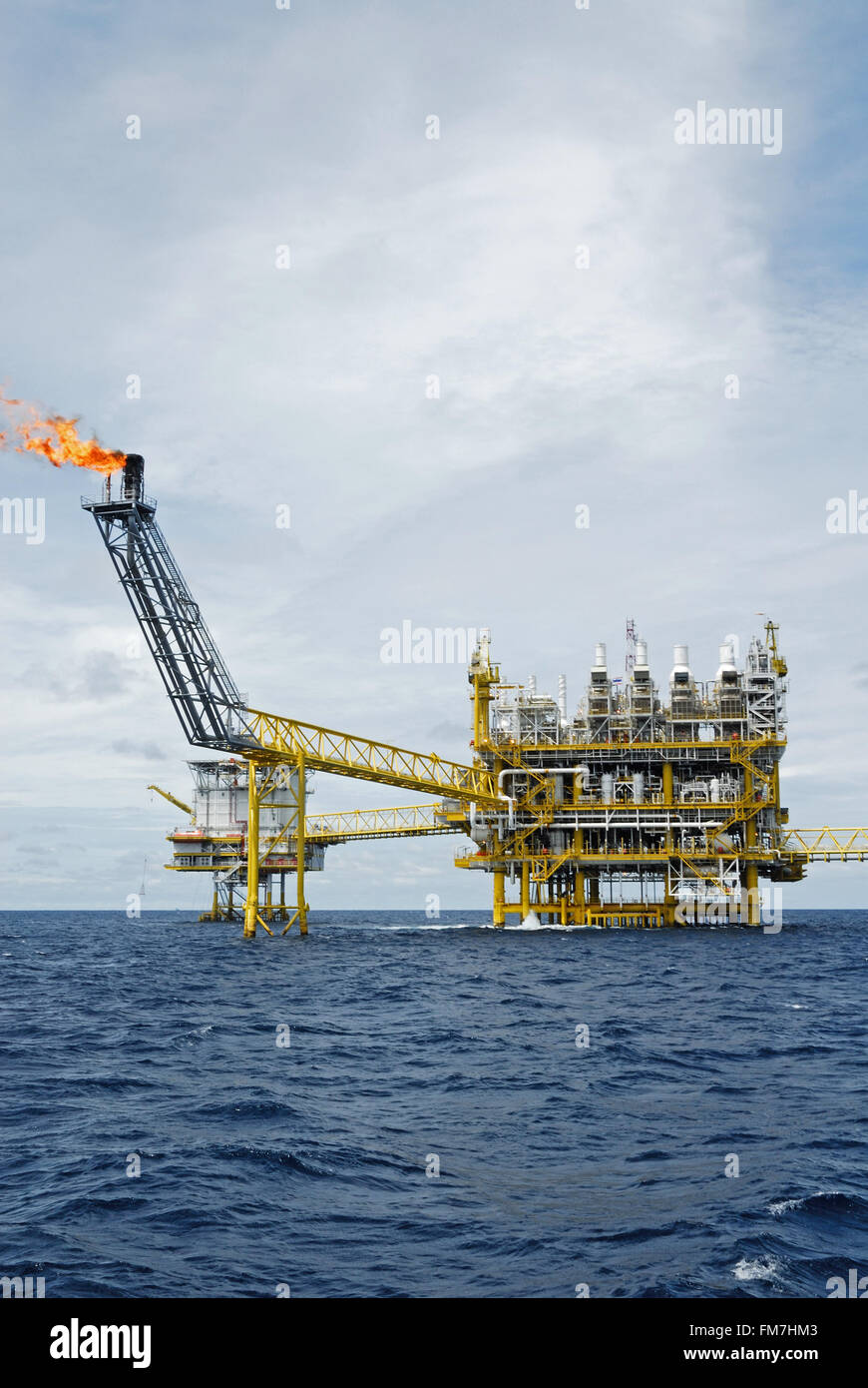 Oil and gas platform with gas burning, Power energy Stock Photo - Alamy