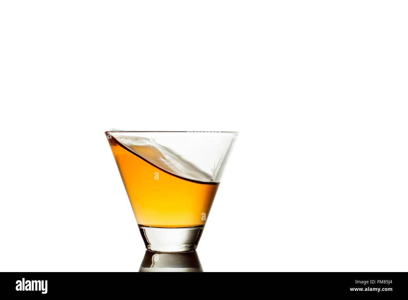 whisky splash in glass isolated on a white background Stock Photo - Alamy