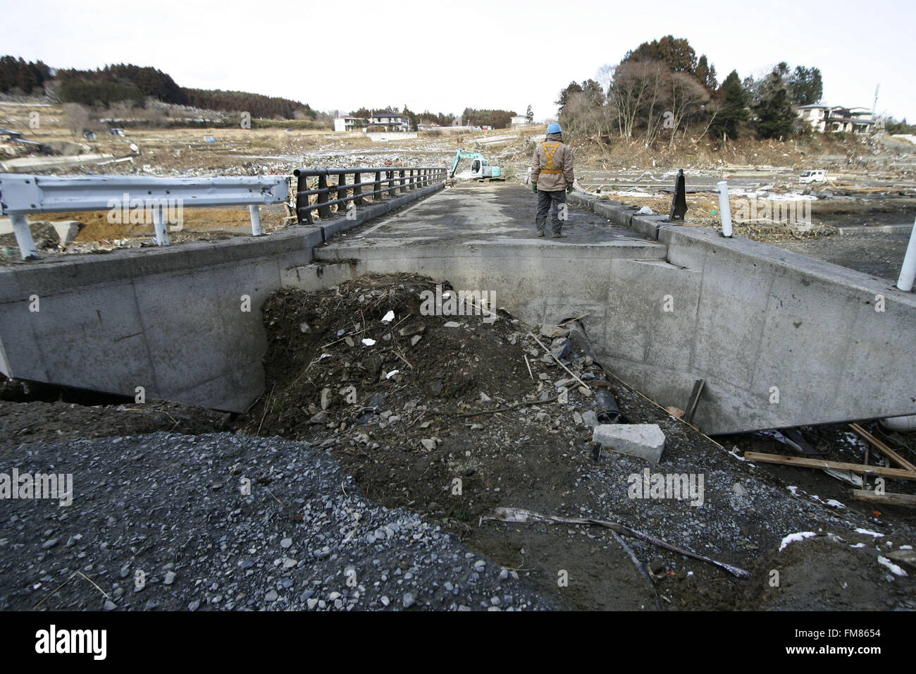 Sanriku Minami, Miyagi Prefecture, Japan. 17th Mar, 2011. Worker look ...