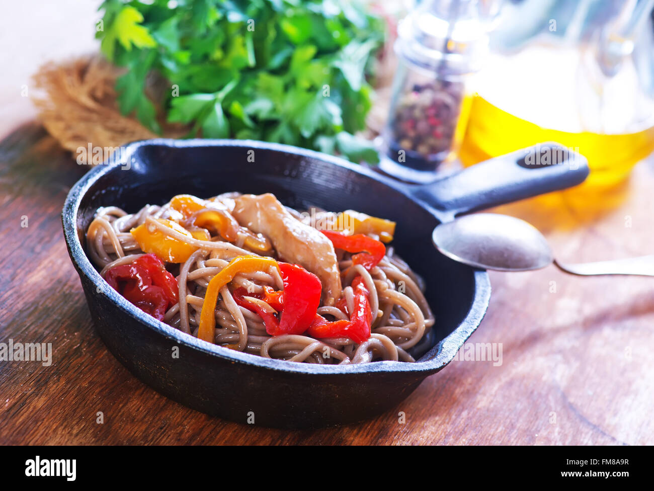 soba with meat and vegetables in the pan Stock Photo - Alamy
