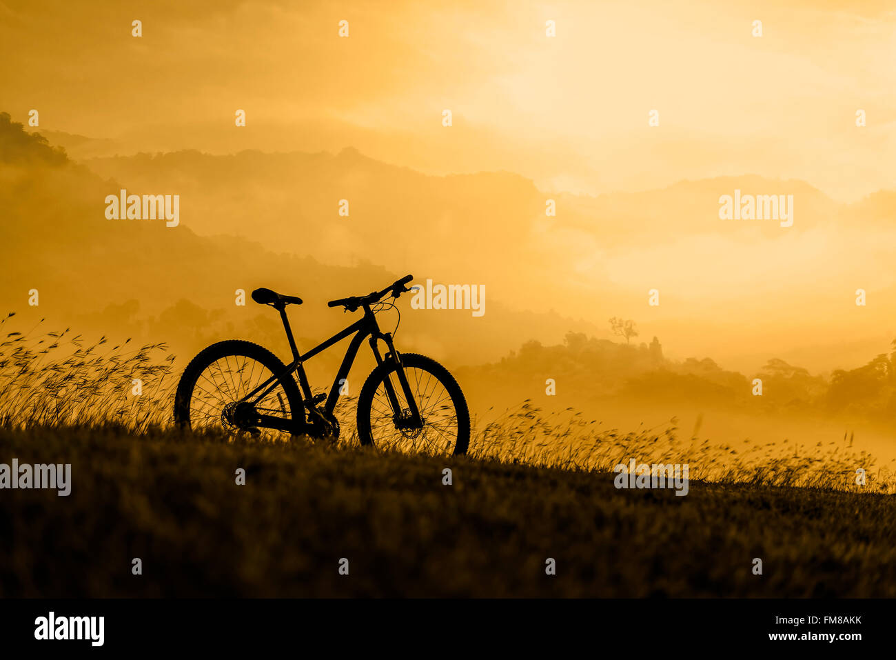 Silhouette Mountain bike on beautiful landscape, Silhouette Bicycle sunset on beautiful ...