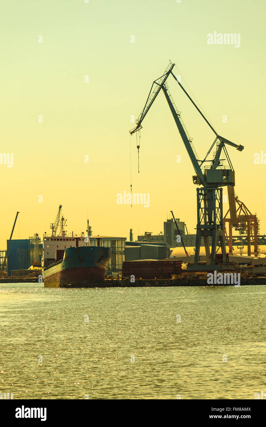 Business and commerce. Heavy load dockside cranes in port, cargo ...