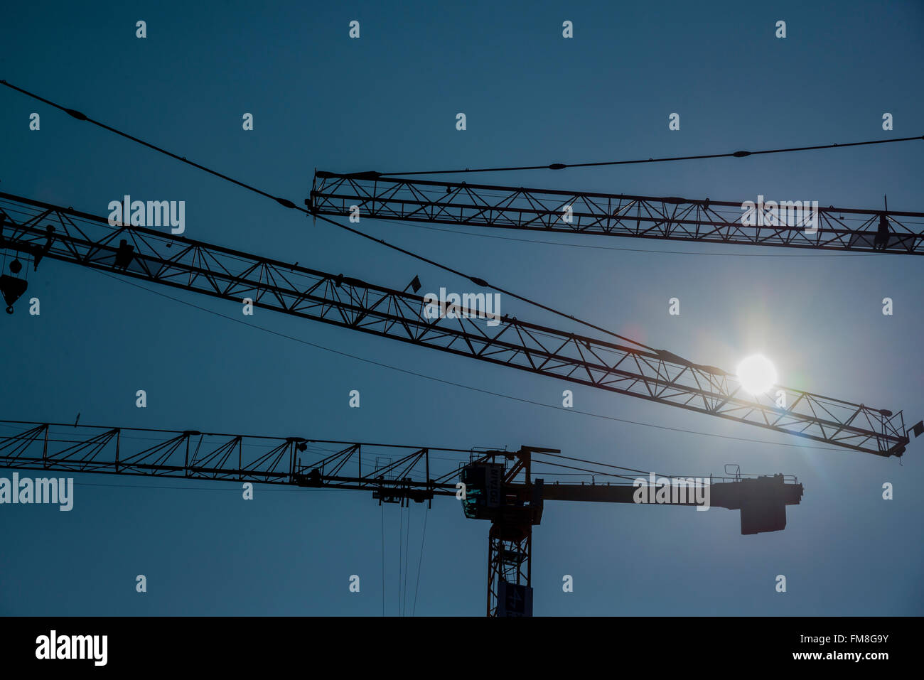 Multiple cranes hi-res stock photography and images - Alamy