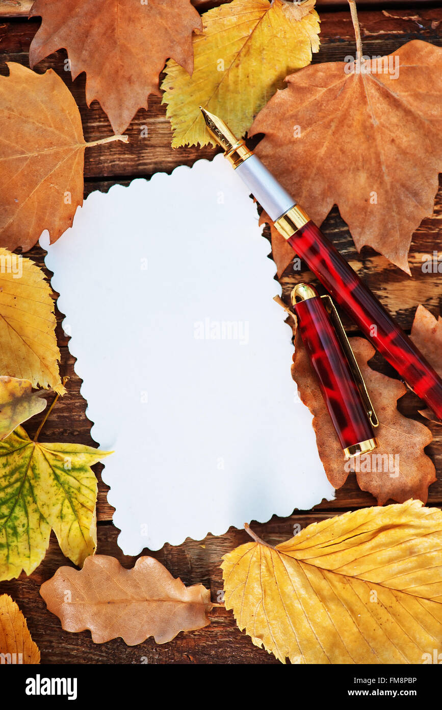autumn leaves on a table, autumn background Stock Photo - Alamy