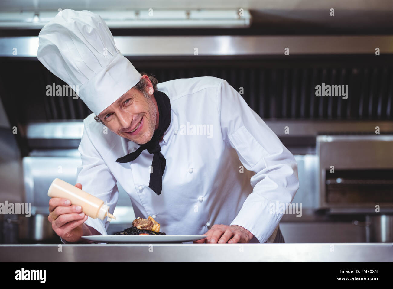 Putting sauce on meat hi-res stock photography and images - Alamy