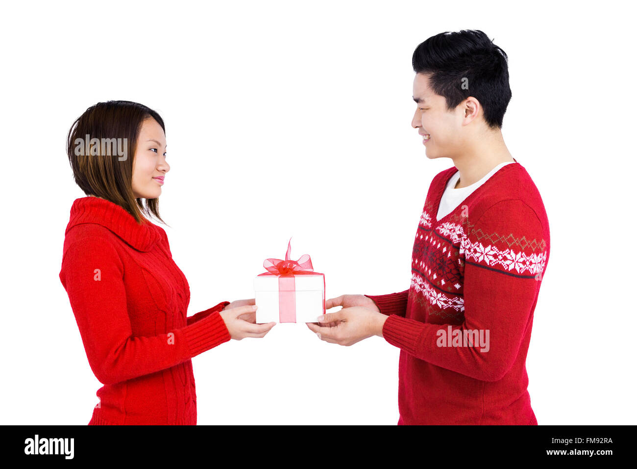 Handsome man giving red Cut Out Stock Images & Pictures - Alamy