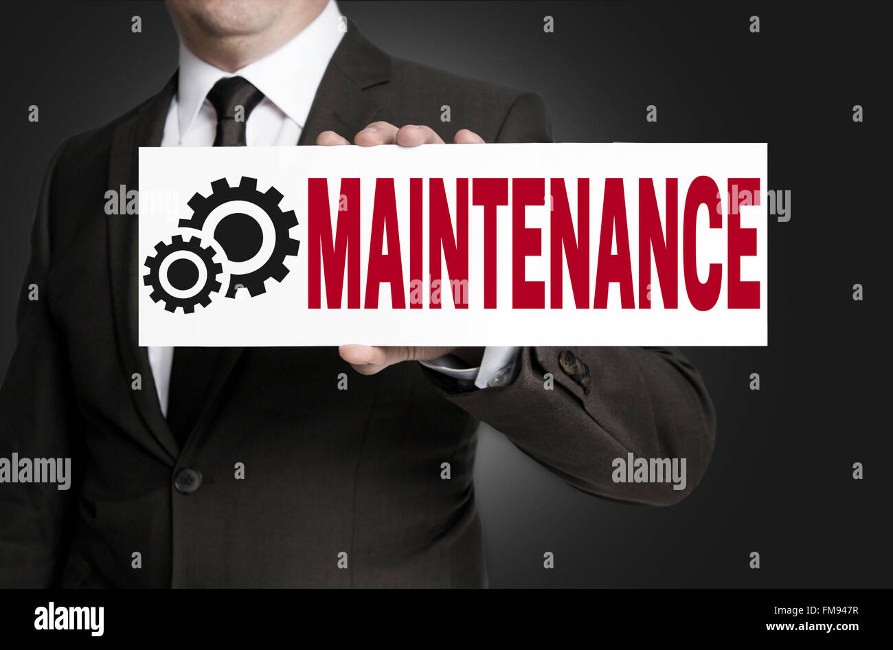 maintenance only sign is held by businessman Stock Photo - Alamy