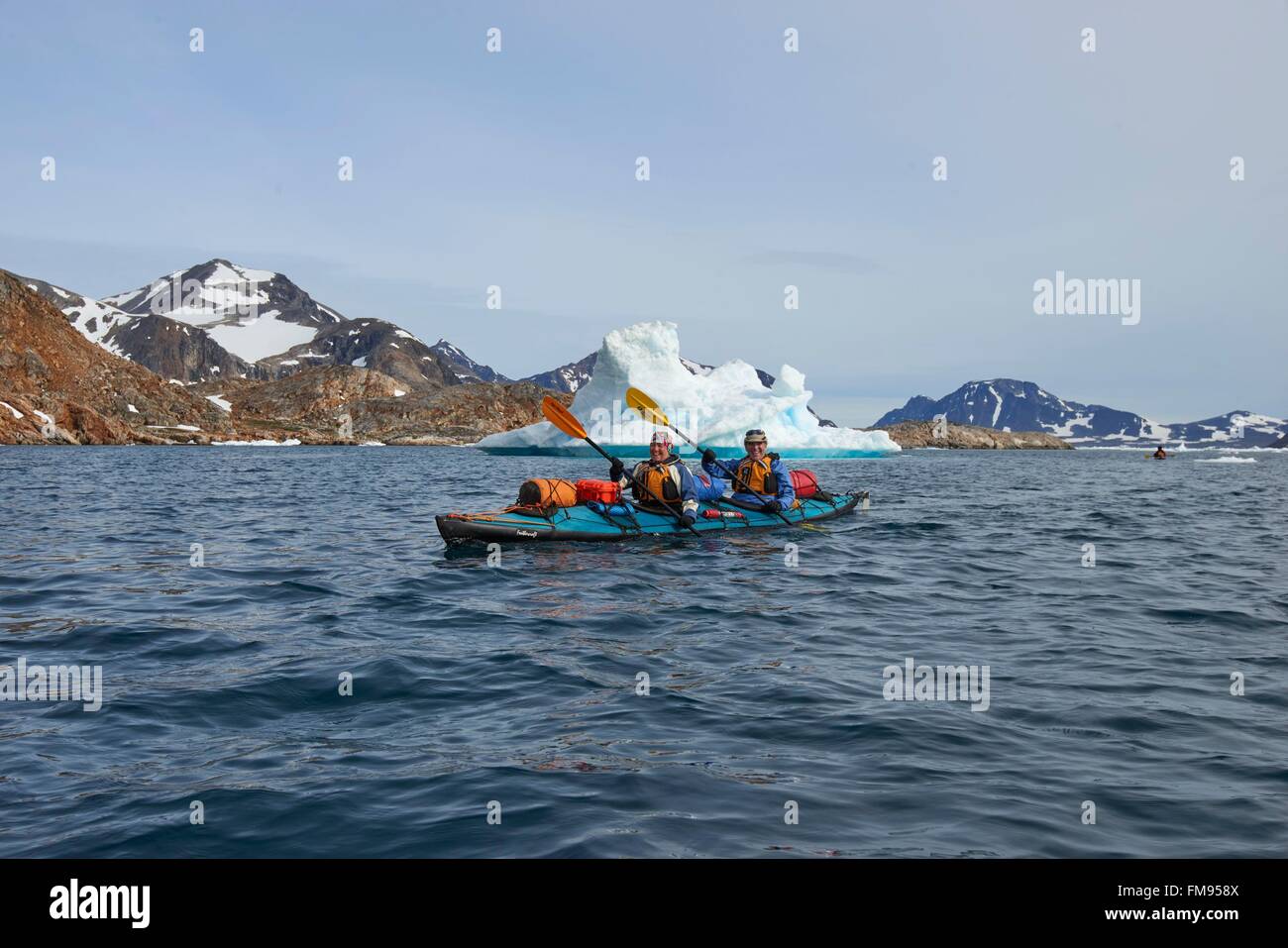 Greenland, Sermersooq, Kulusuk, Inuit village of Kulusuk, sea kayaks in ...