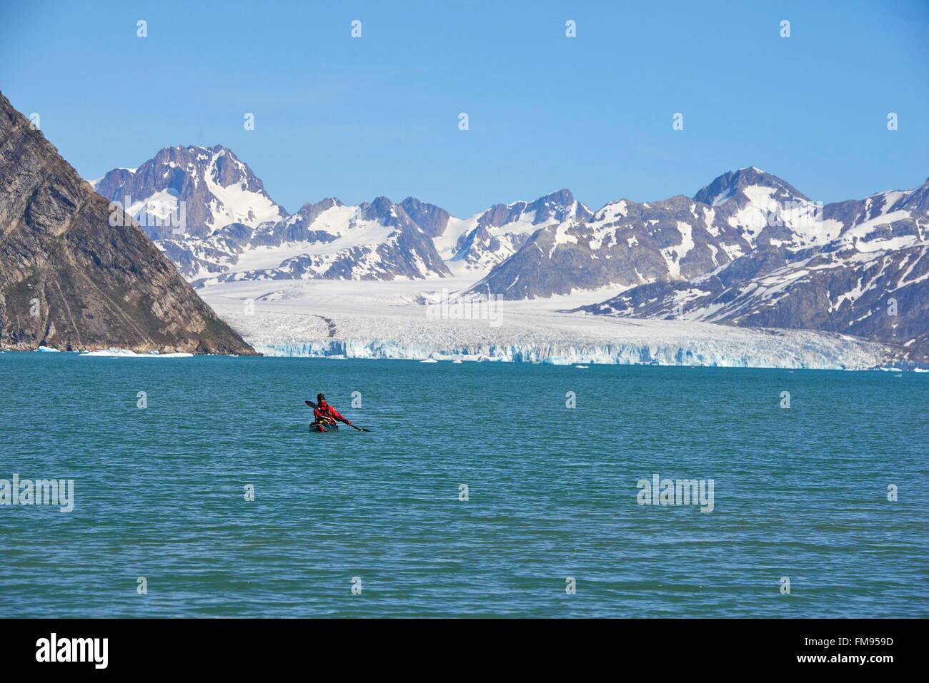 Greenland, Sermersooq, Kulusuk, Inuit village of Kulusuk, sea kayaks in ...