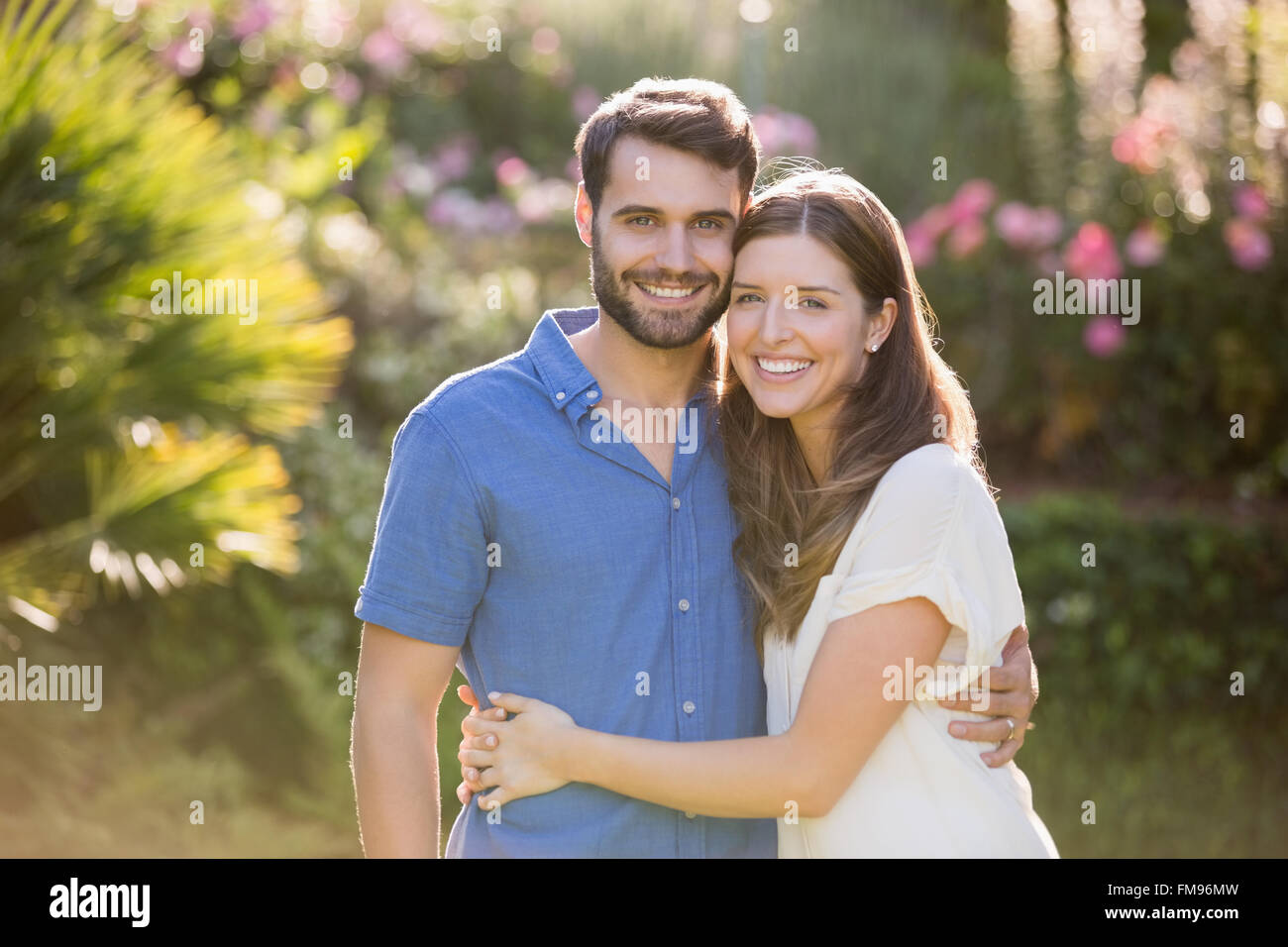 Portrait of couple embracing Stock Photo - Alamy