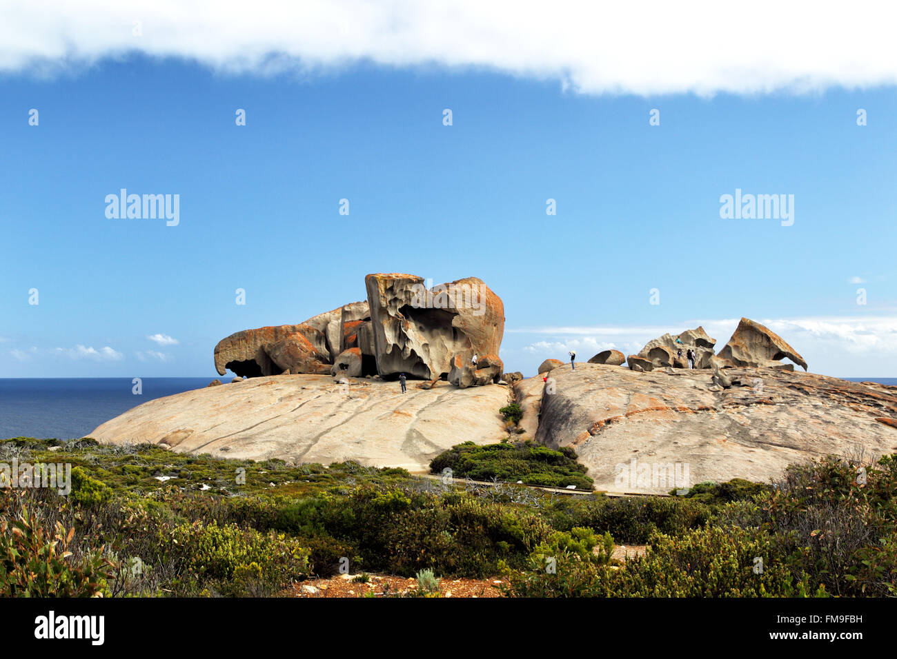 Tourists visiting the Remarkable Rocks, a natural rock formation, in ...