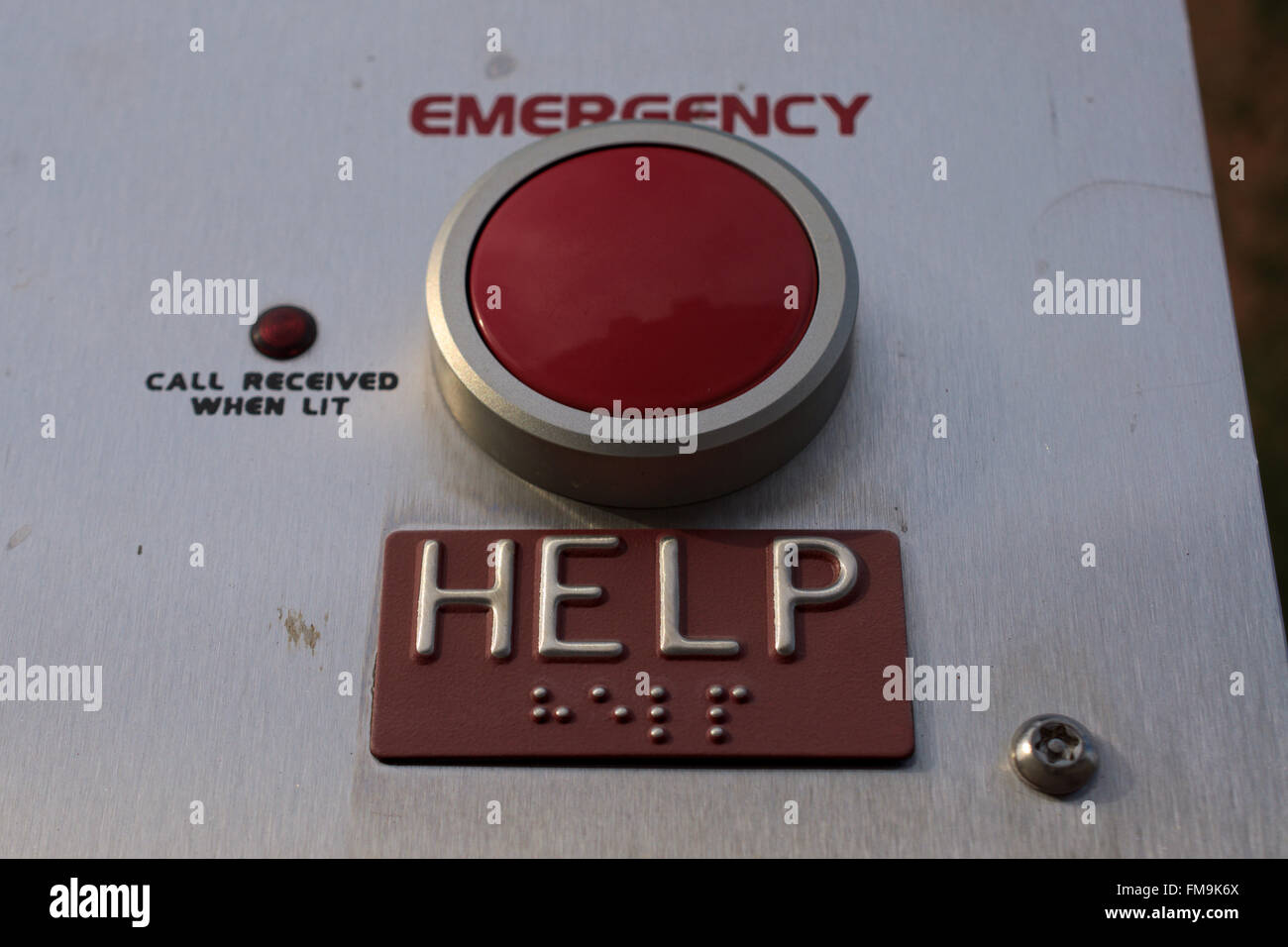 A red help button with a "call received when lit" indicator to the left ...