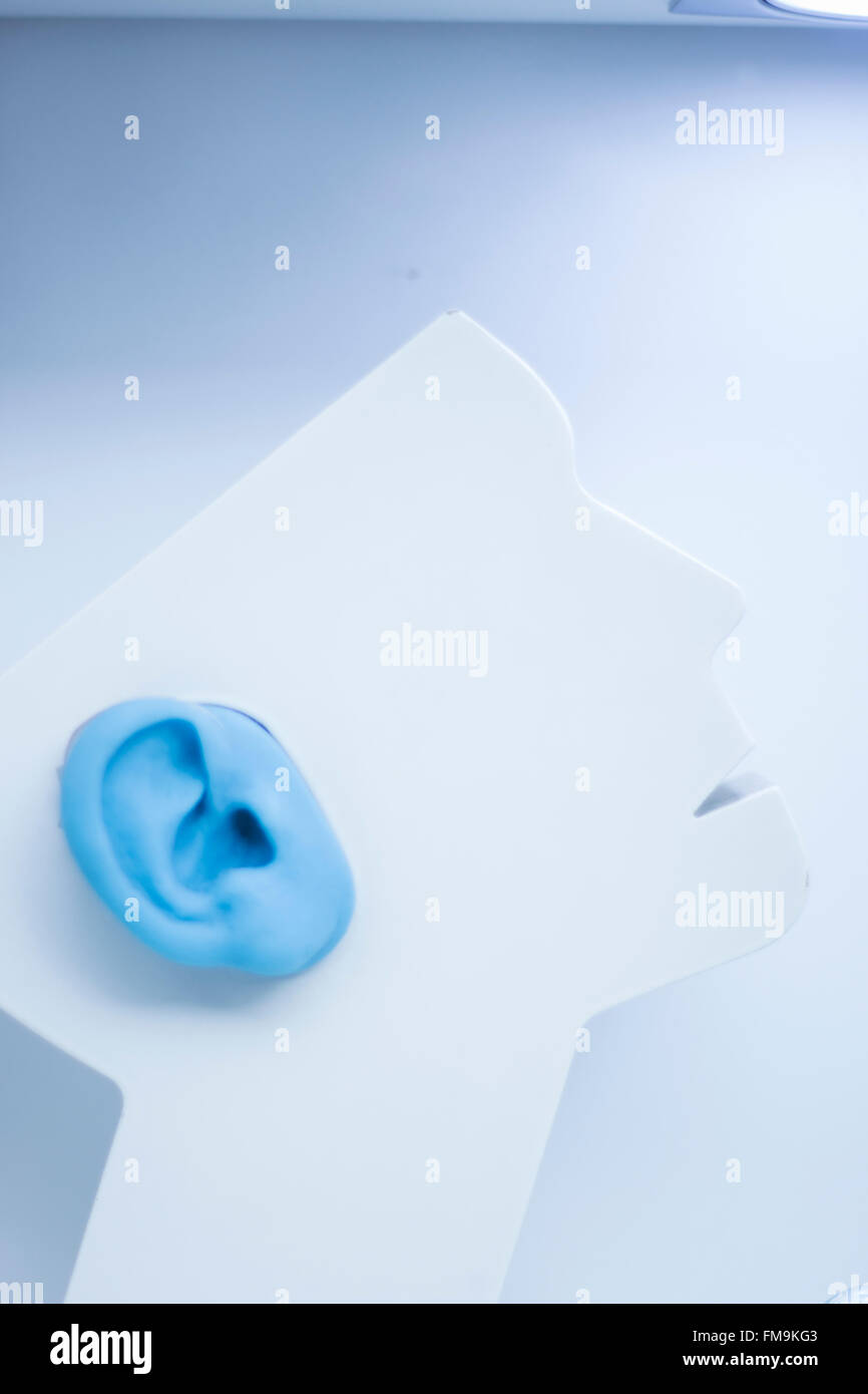 Hearing aid on prosthetic ear in store shop window display Stock Photo ...