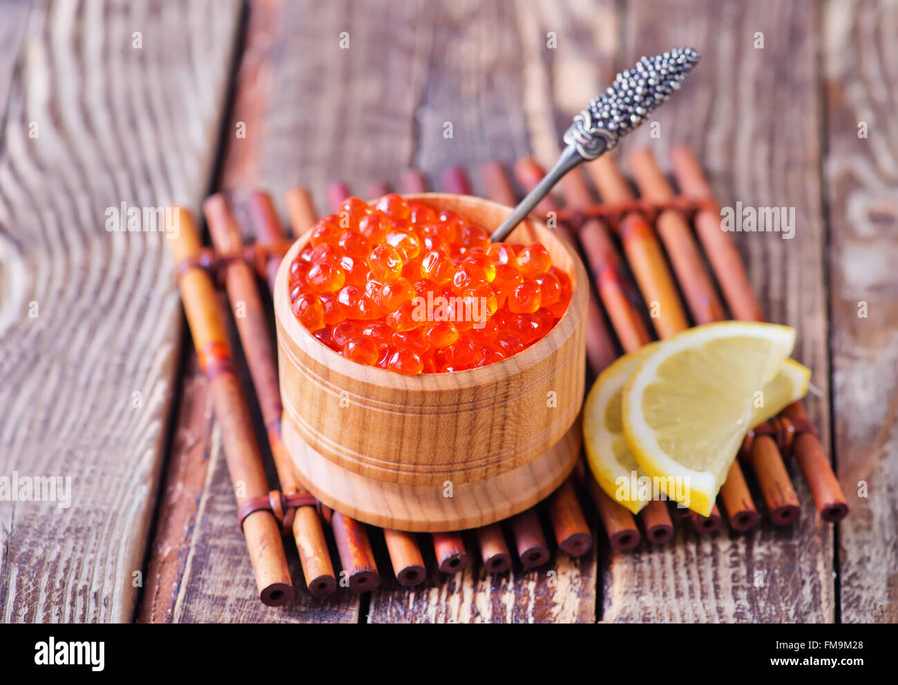 red salmon caviar in bowl and on a table Stock Photo - Alamy