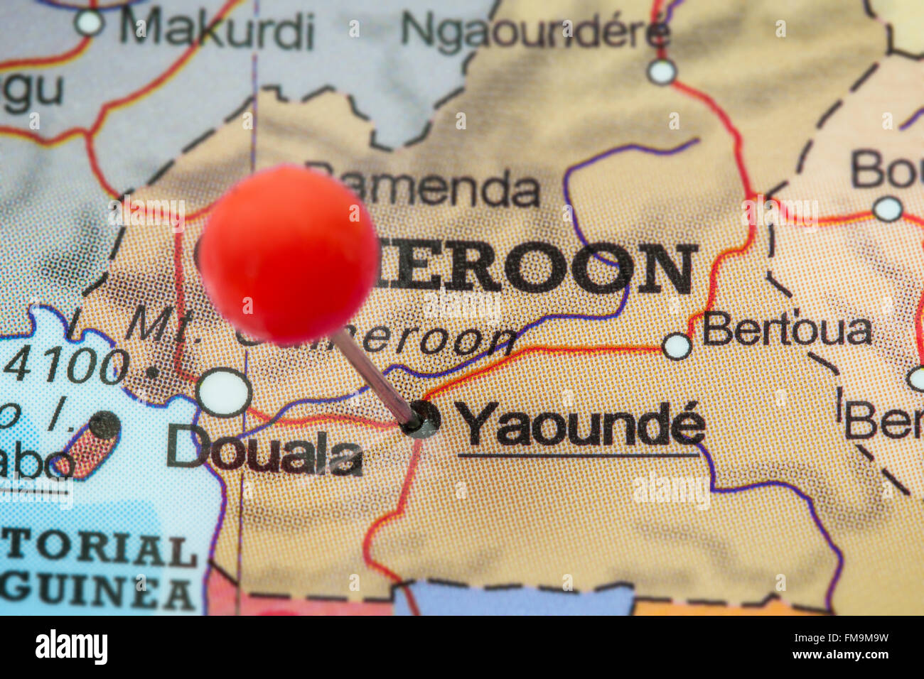 Close-up of a red pushpin in a map of Yaounde, Cameroon Stock Photo - Alamy