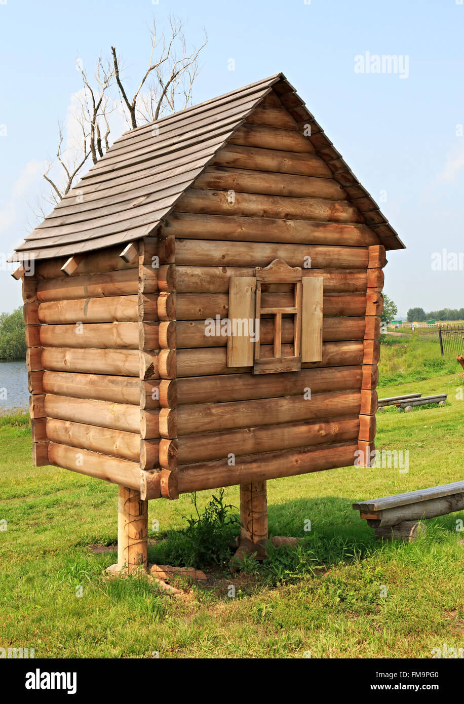 Hut on chicken legs. Wooden sculptures based on Pushkin's fairy tales ...
