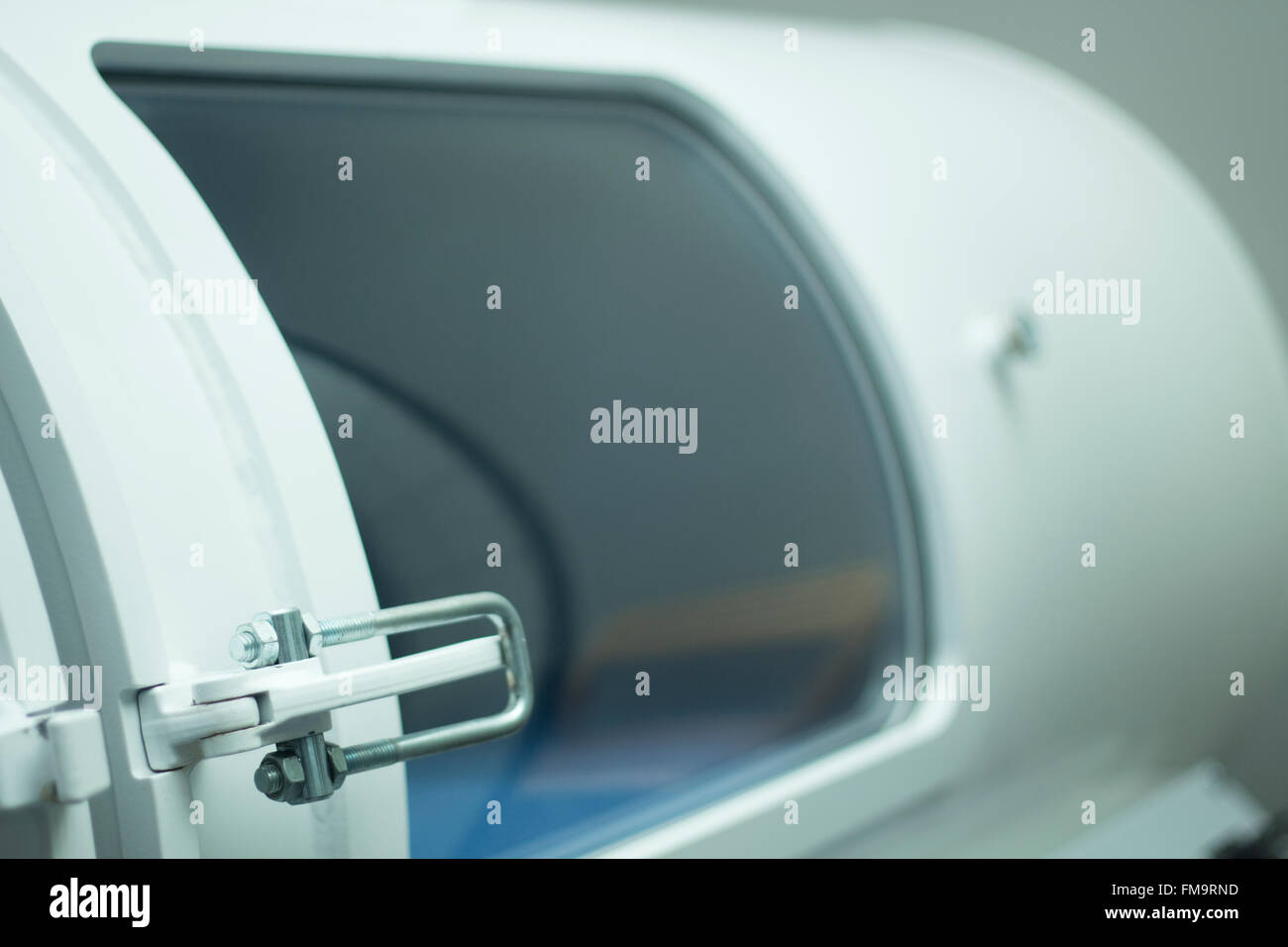 Hyperbaric oxygen therapy HBOT chamber tank in medical hospital clinic ...