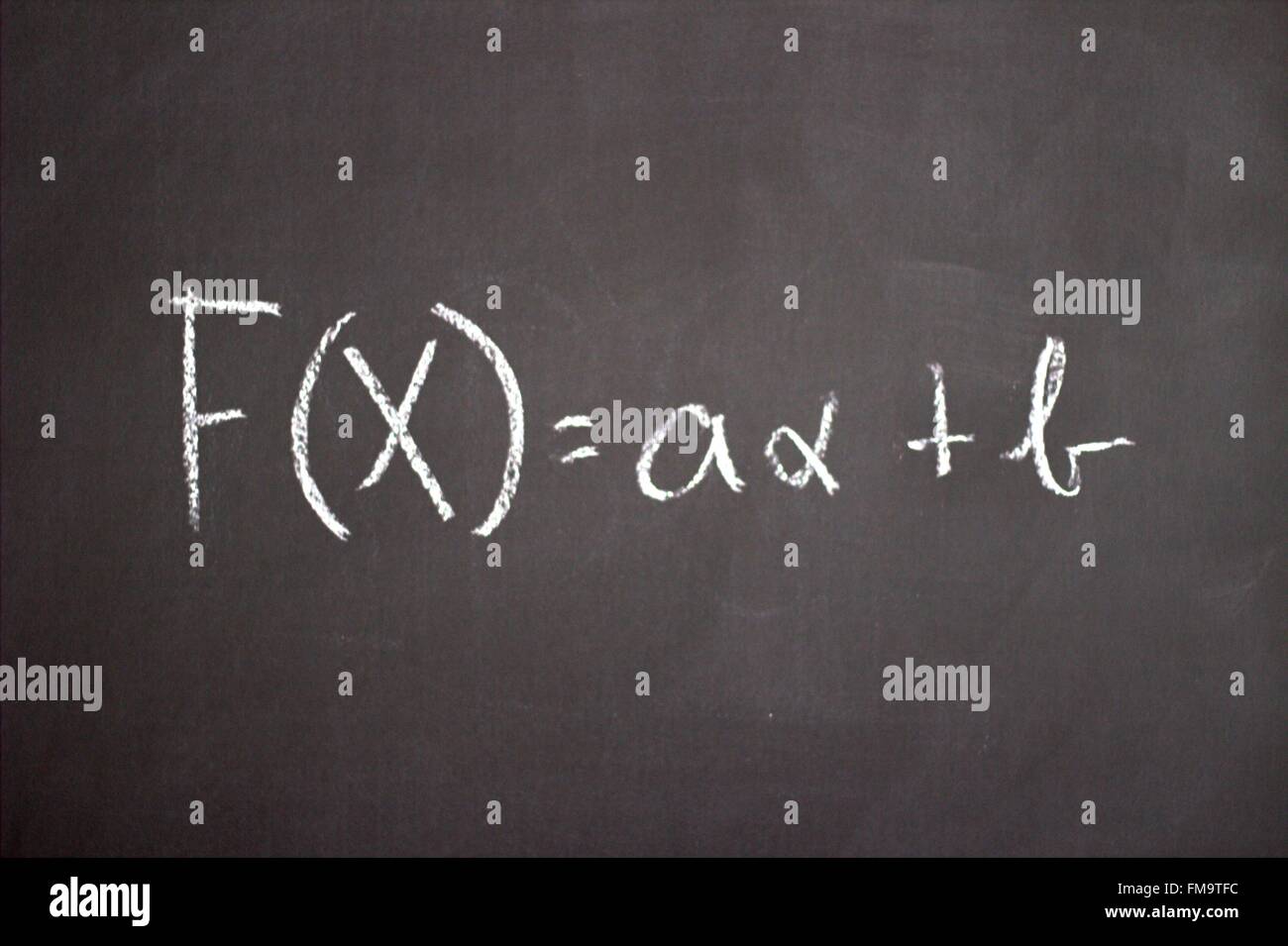 Studying the science of mathematics and economics on a blackboard Stock ...