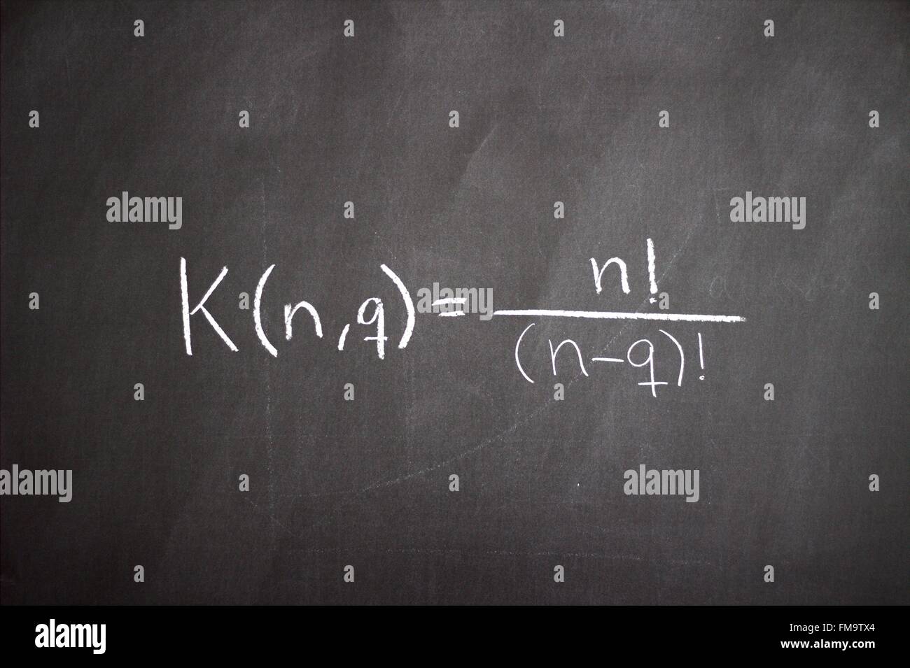 Studying the science of mathematics and economics on a blackboard Stock ...