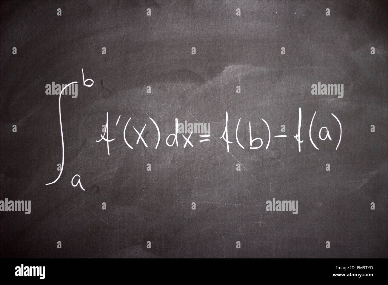 Studying the science of mathematics and economics on a blackboard Stock ...