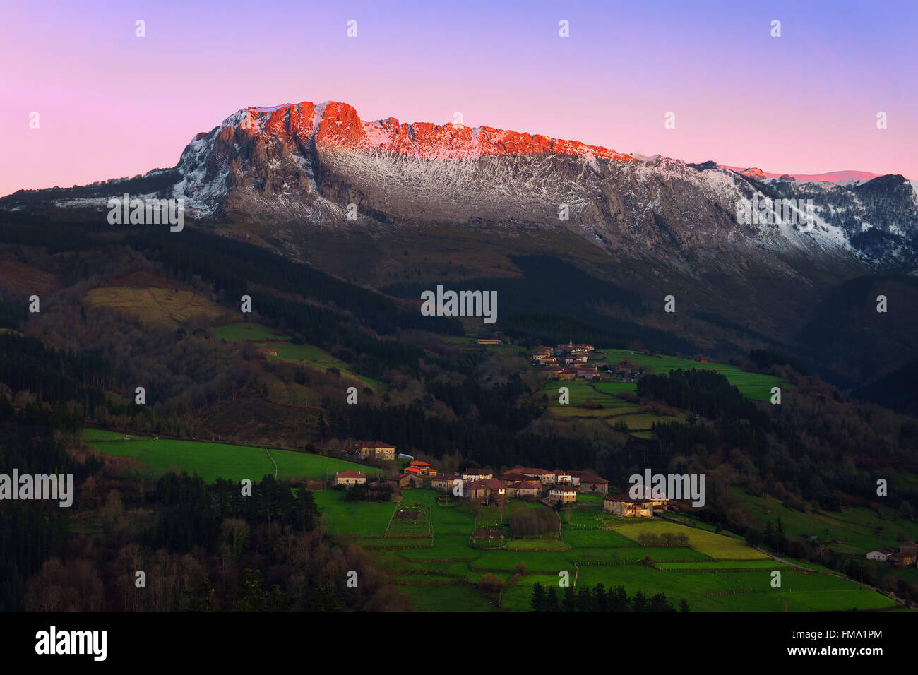 Itxina mountain with Zaloa and Urigoiti villages at sunset. Orozko ...