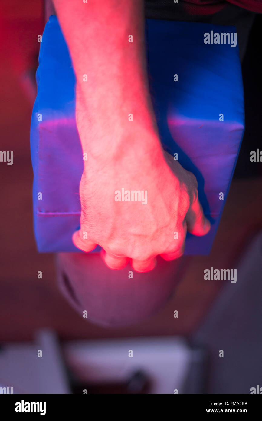 Physical therapy clinic of hospital. Patient having heat lamp ...