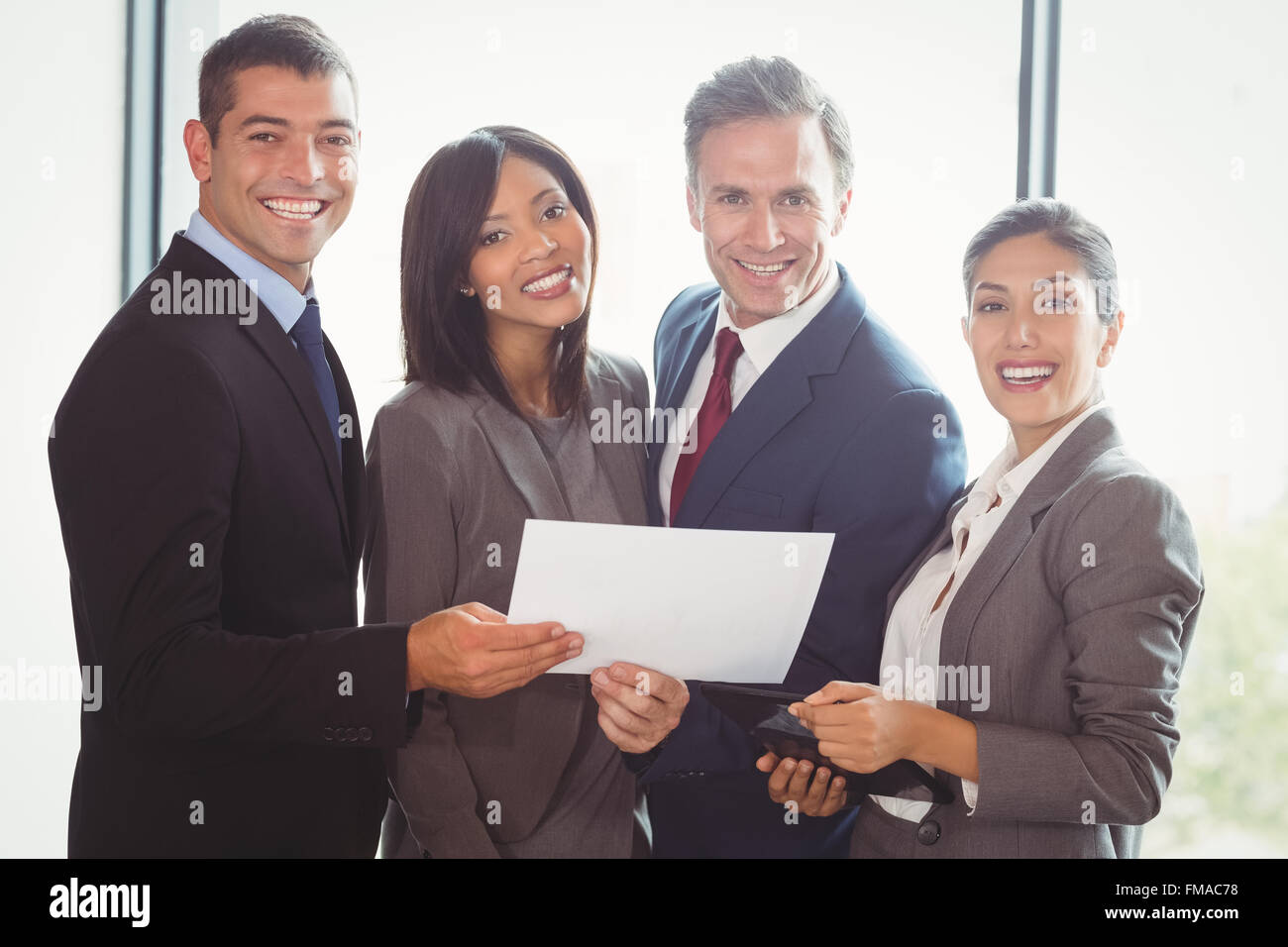 Businesspeople working in office Stock Photo - Alamy