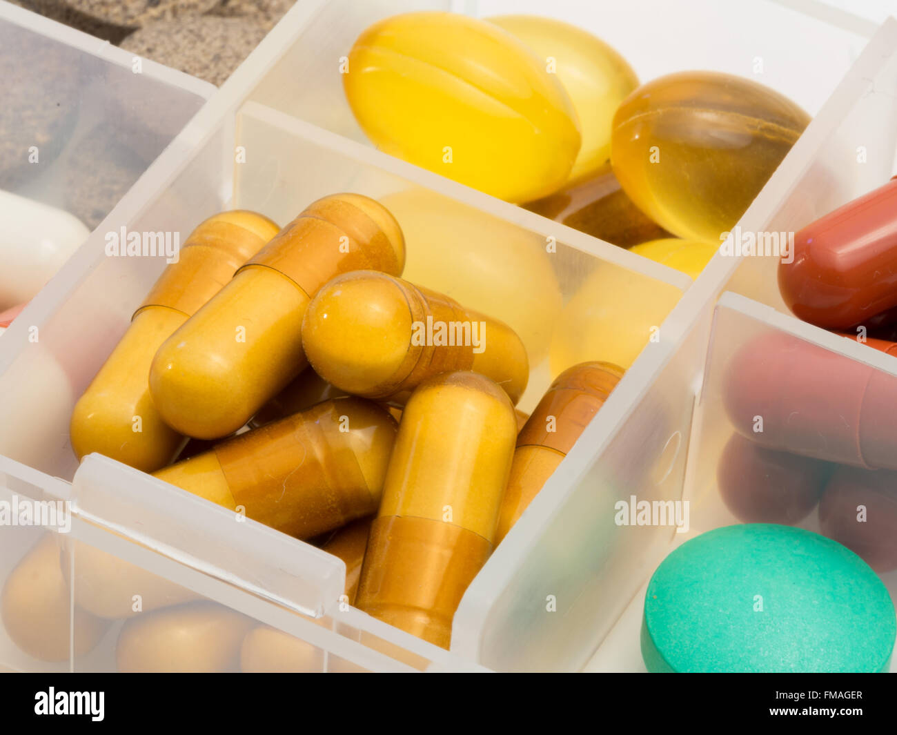 A container for pills with different medicines Stock Photo - Alamy