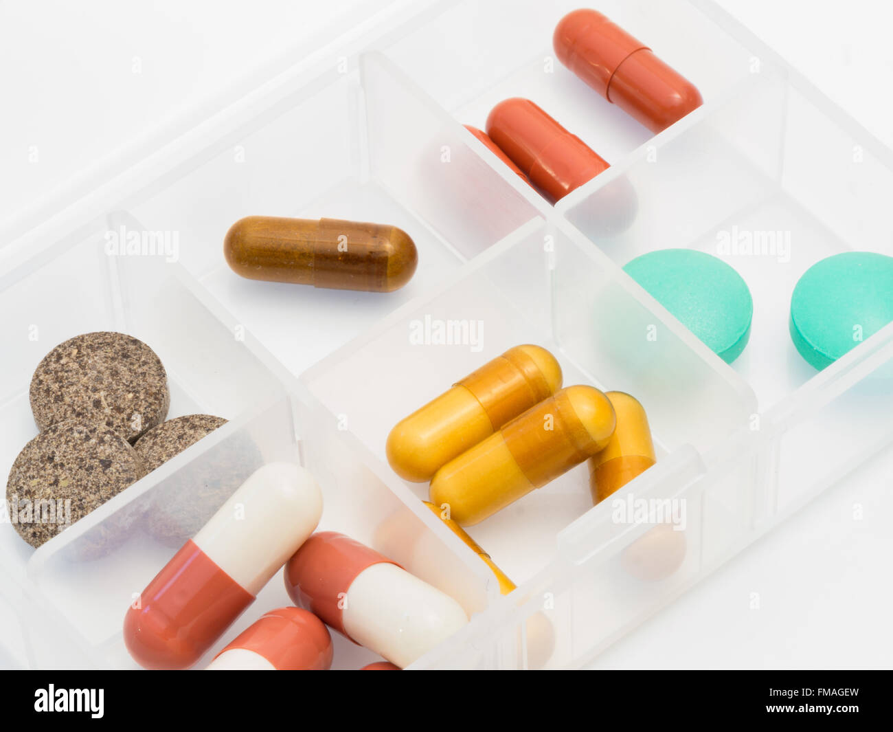 A container for pills with different medicines Stock Photo - Alamy