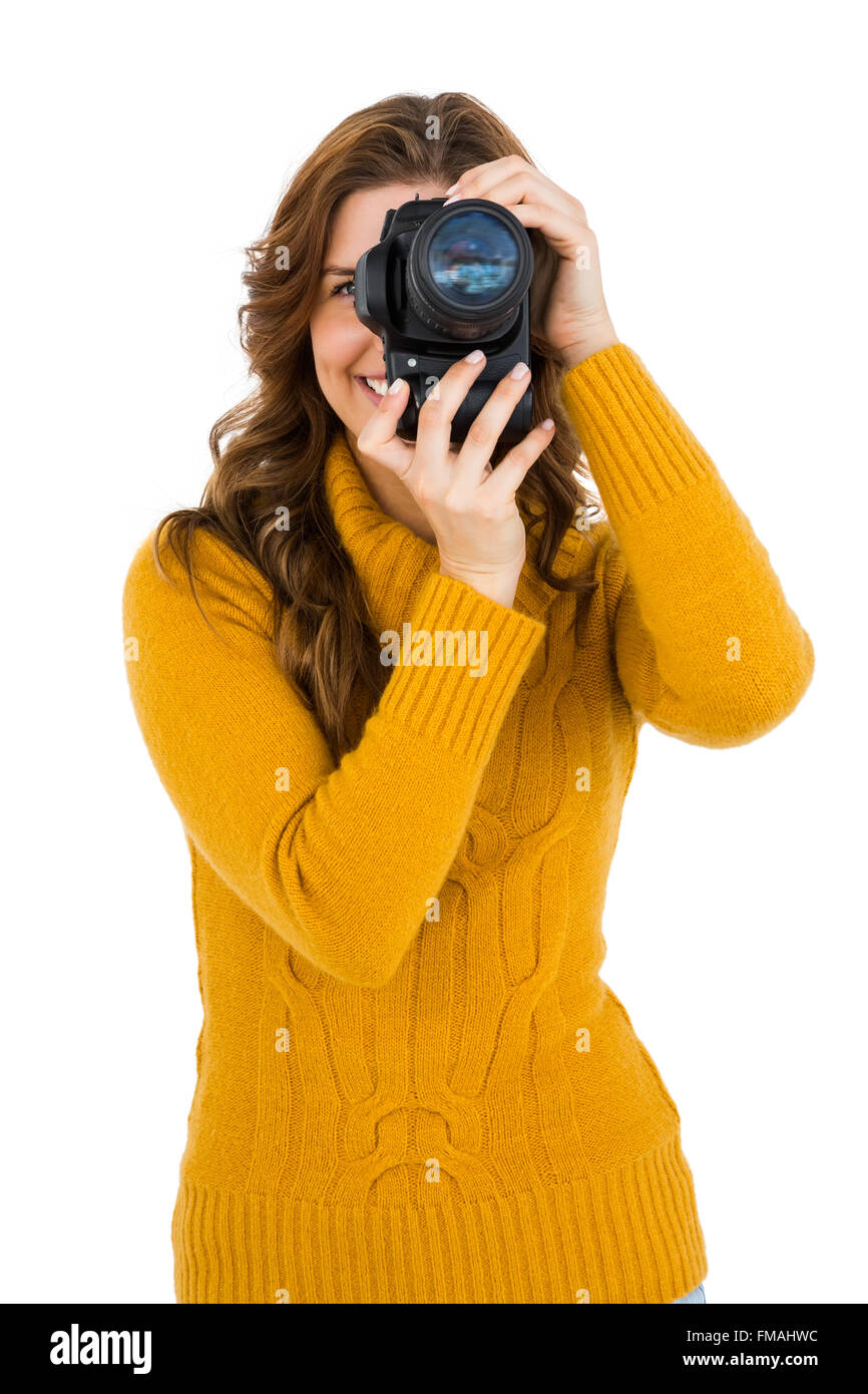 Woman photographing with camera Stock Photo - Alamy