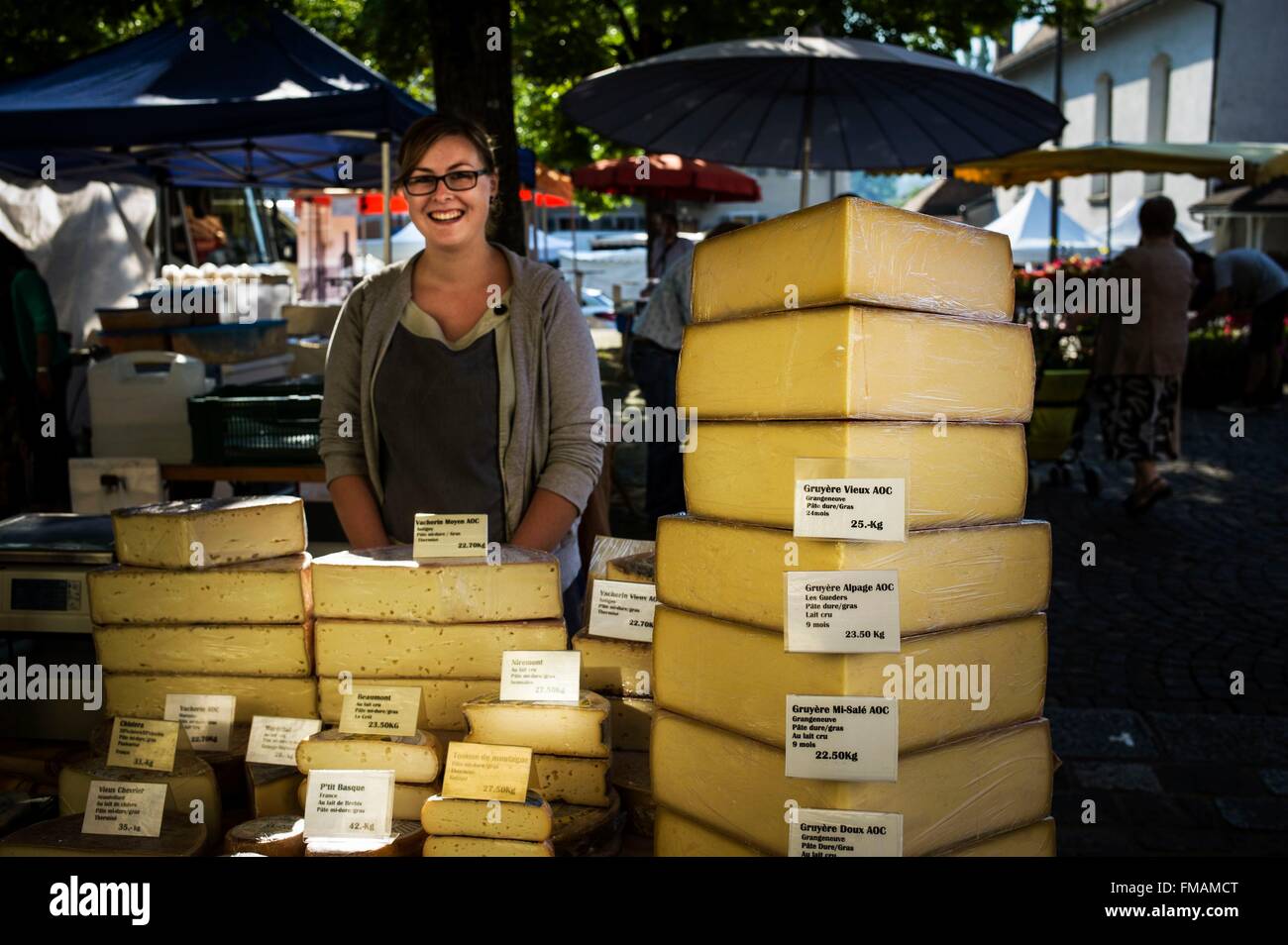 Switzerland, Canton of Fribourg, Bulle, city market day, cheese stand ...