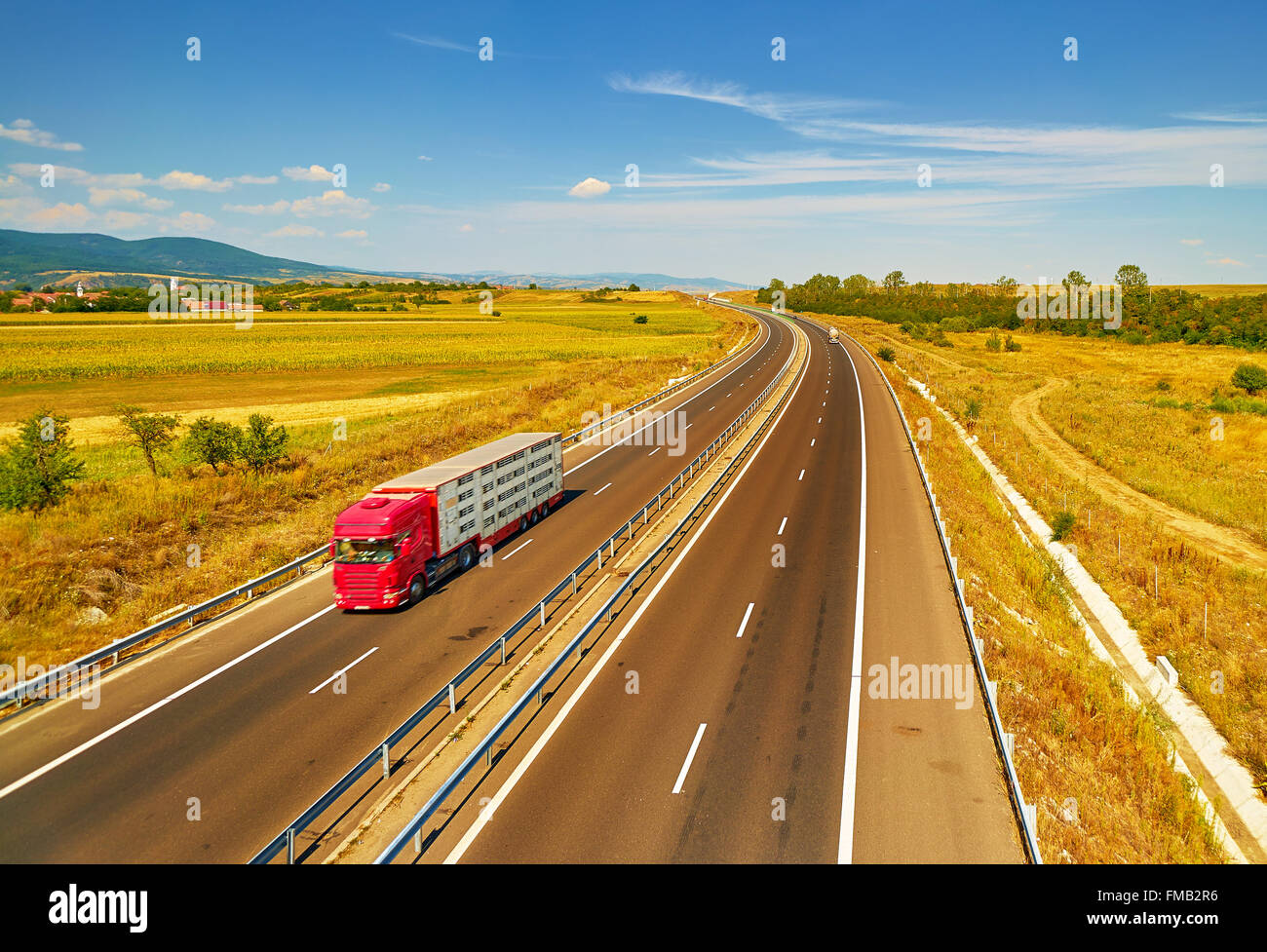 Freight Truck on Highway- Transportation Background Stock Photo - Alamy