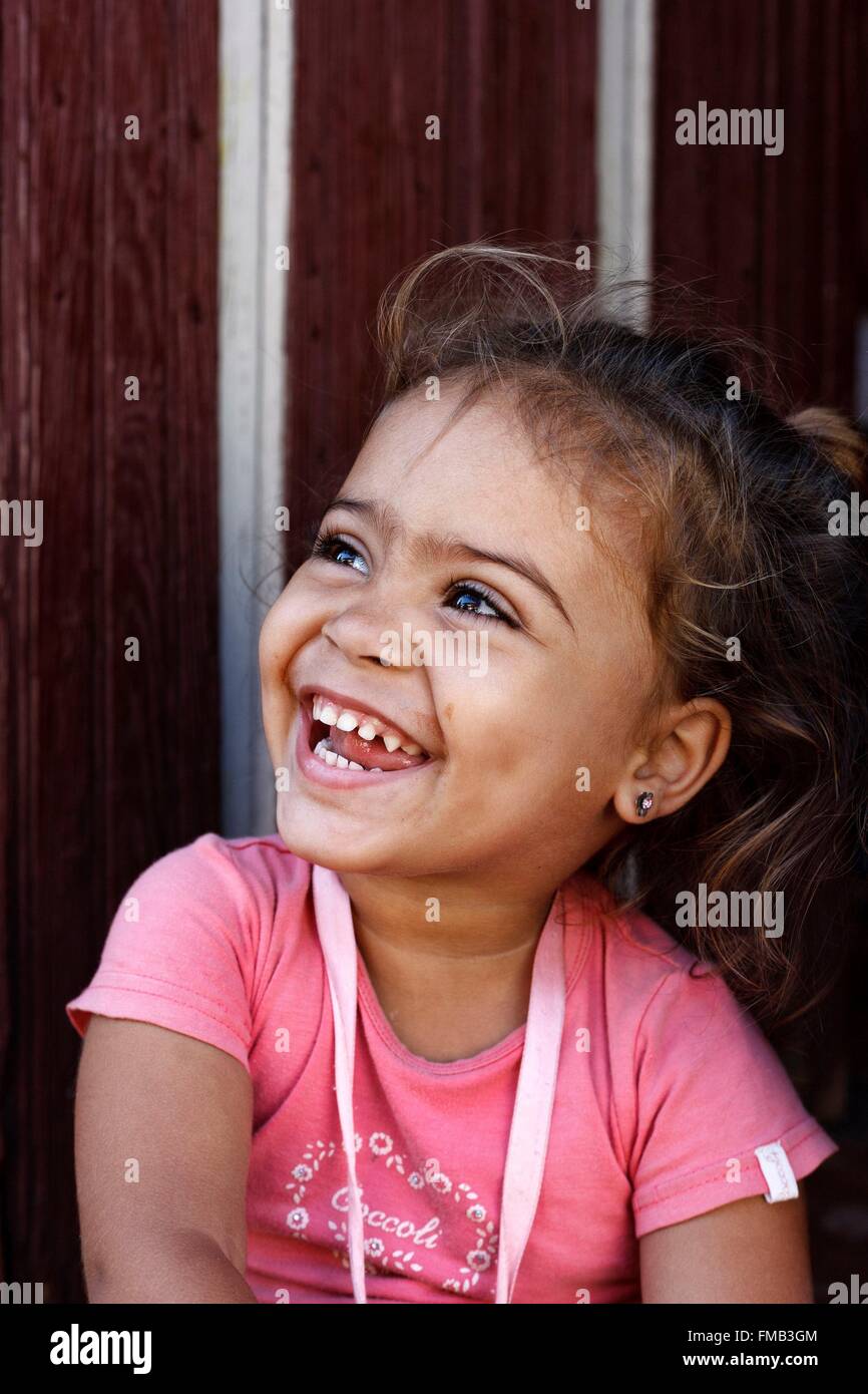 Cuba, Guantanamo, Baracoa, Smiling girl in pink top Stock Photo - Alamy