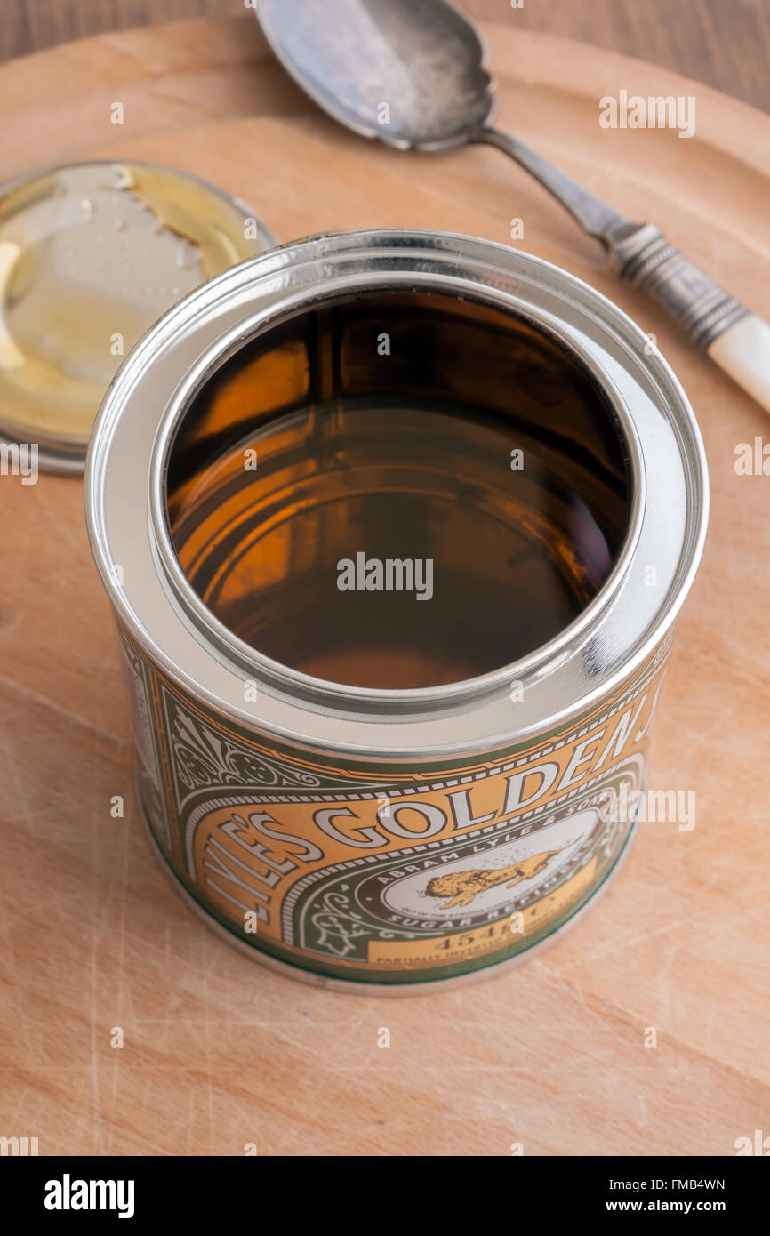 Lyle's Golden Syrup in its distinctive green and gold tin marketed ...