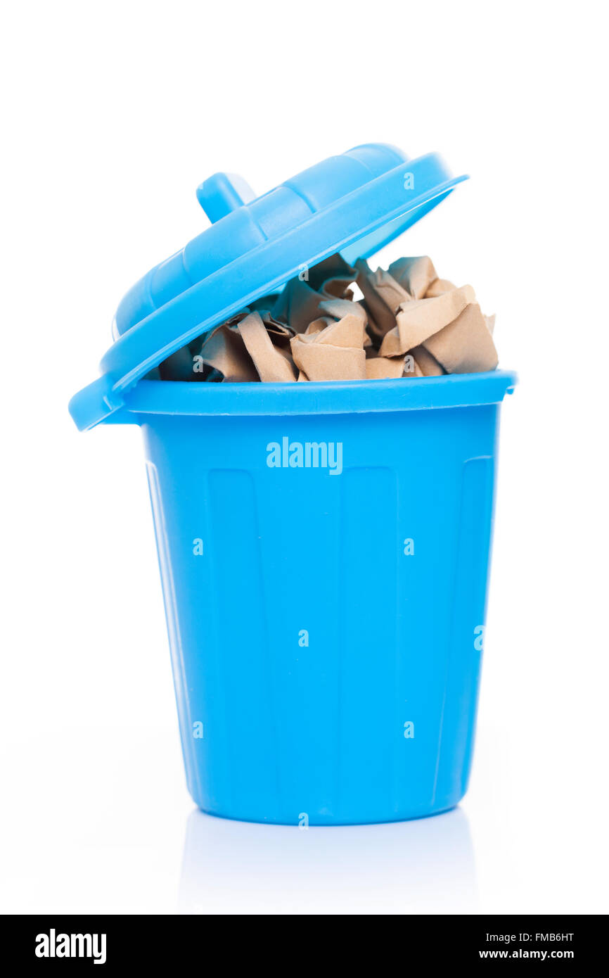 A blue bin full of crumpled paper, isolated on white background Stock ...